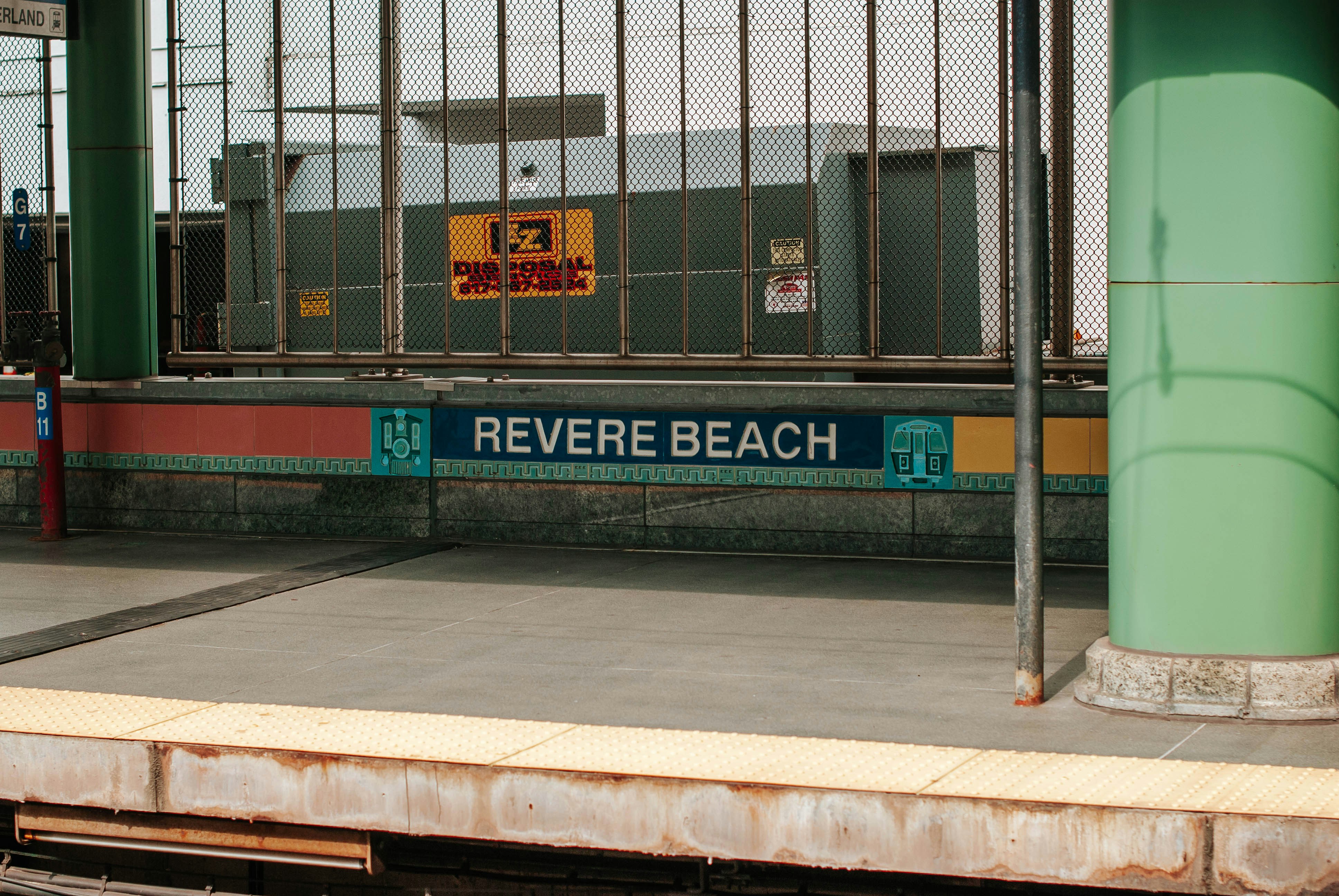 A train station with a sign that reads reverse beach photo – Free ...