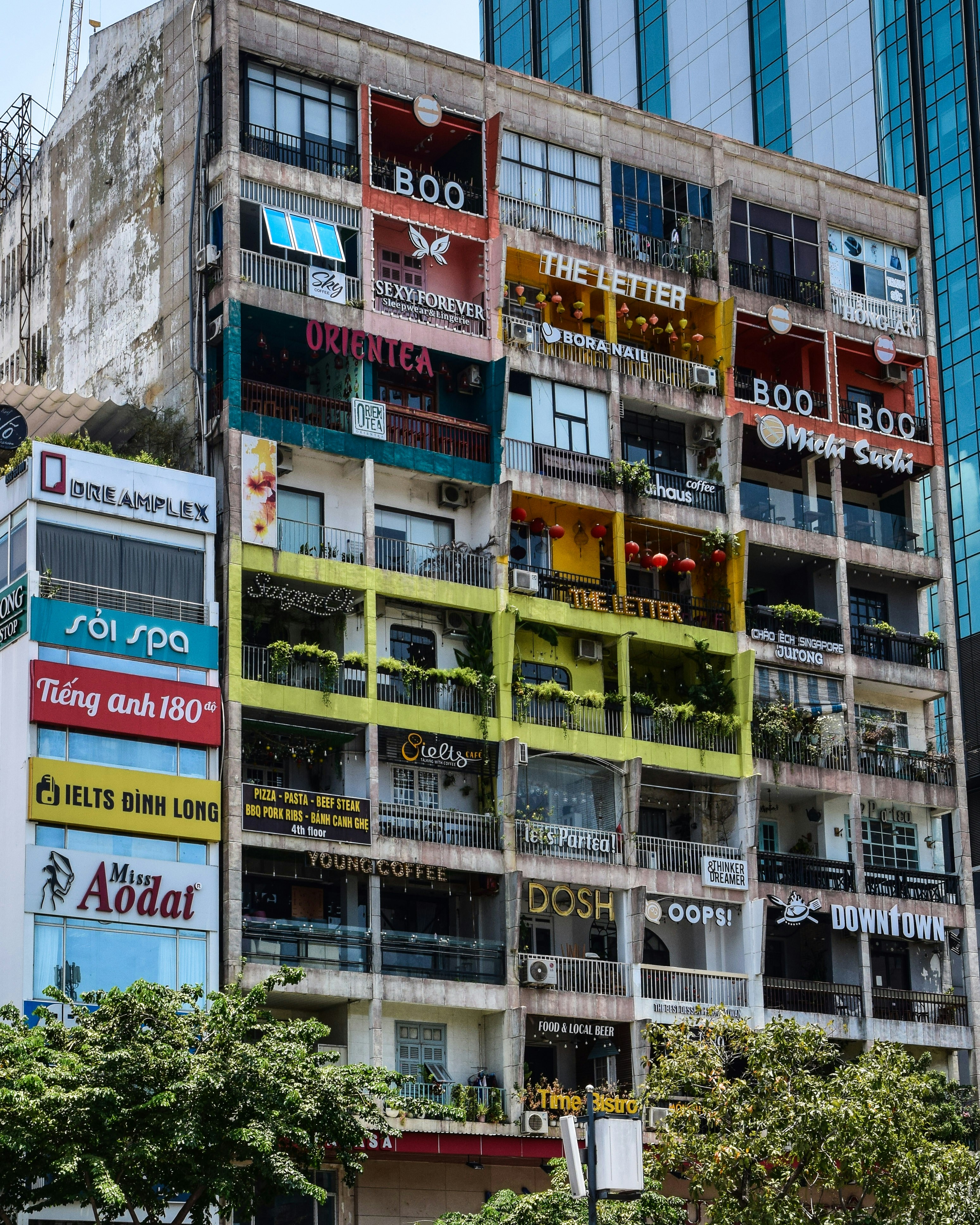 White red and yellow concrete building photo – Free Hồ chí minh Image ...