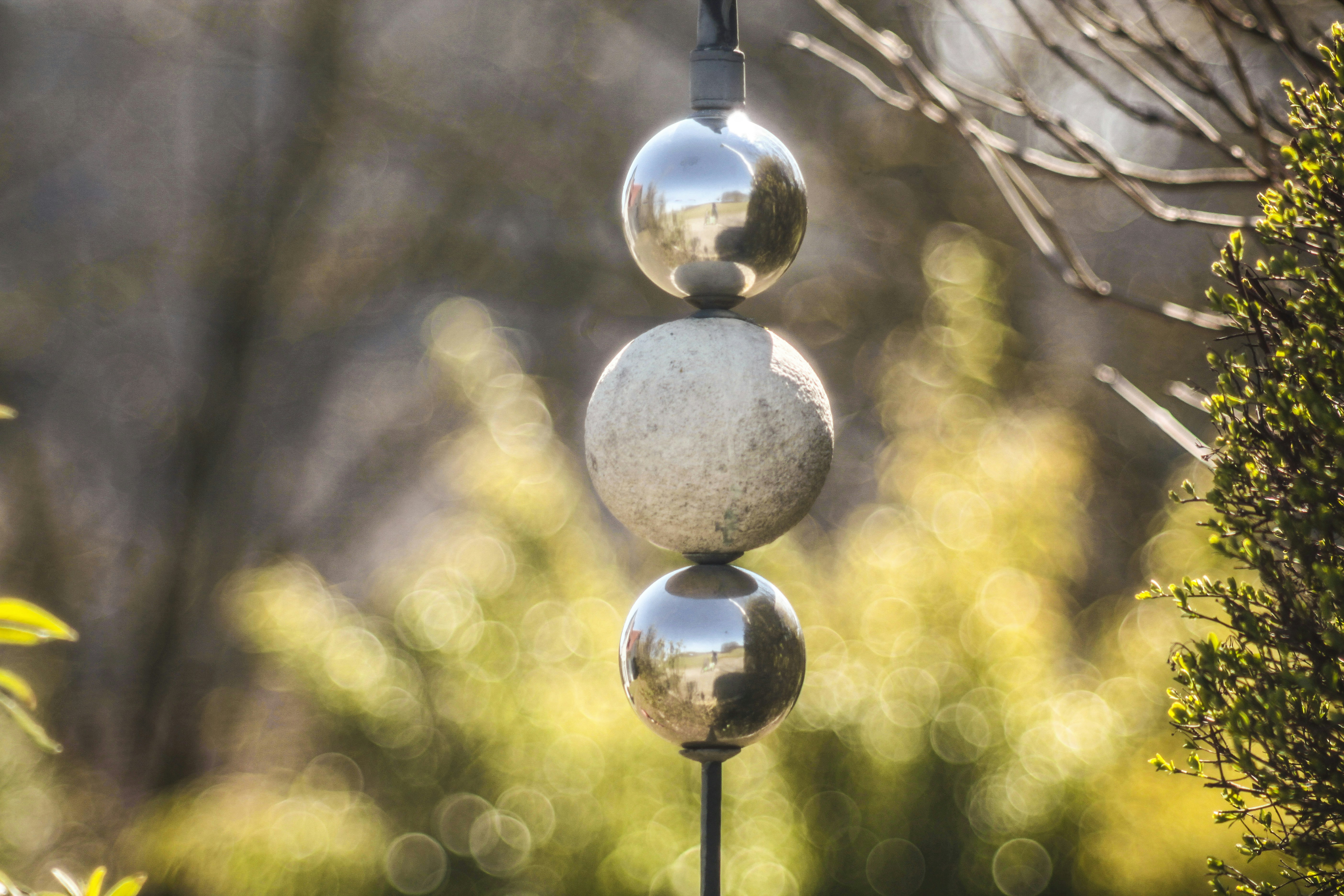 Polished Spheres on a Stem: Quiet Geometry in Spring Light