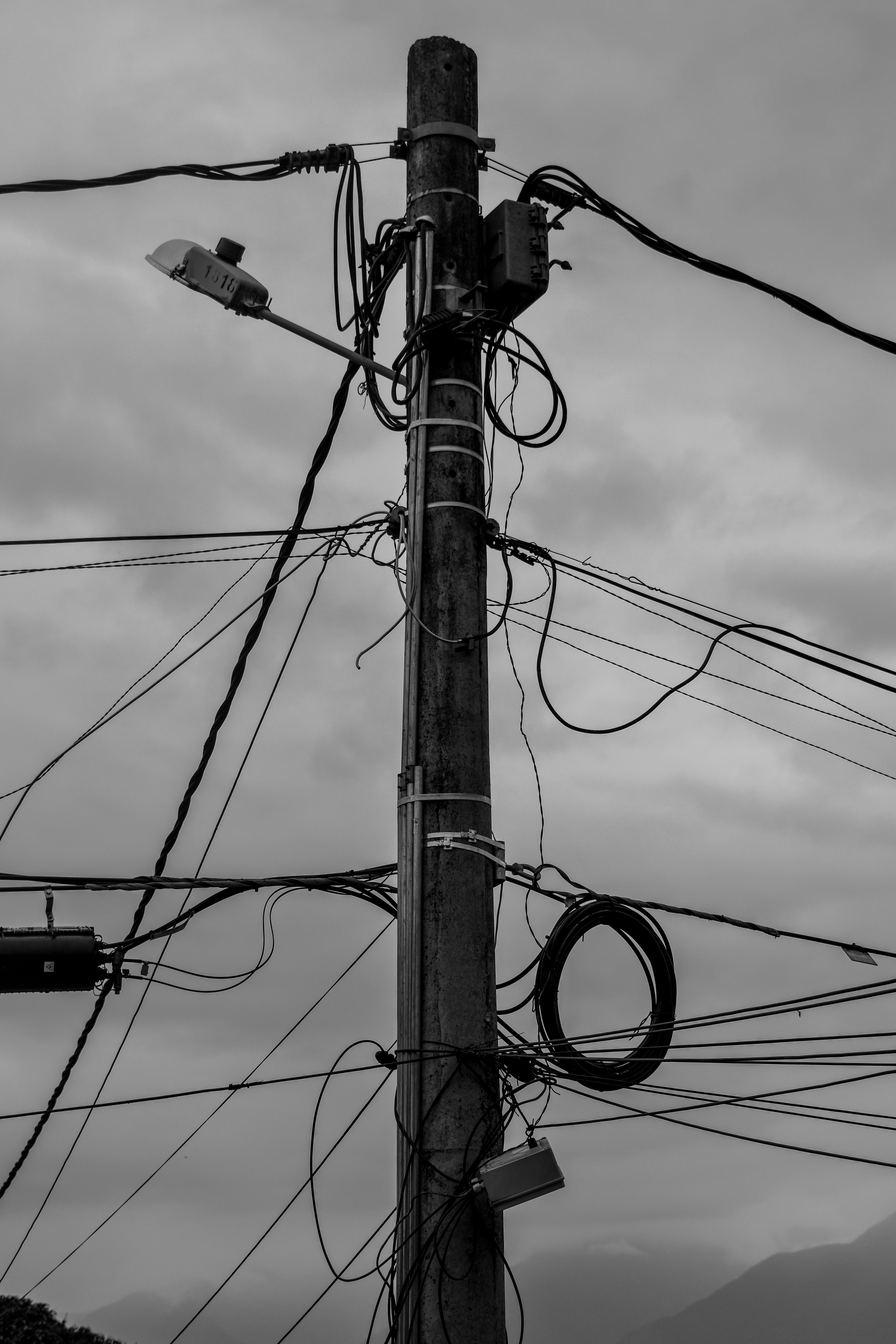 Grayscale photo of electric post photo – Free Cumaral Image on Unsplash