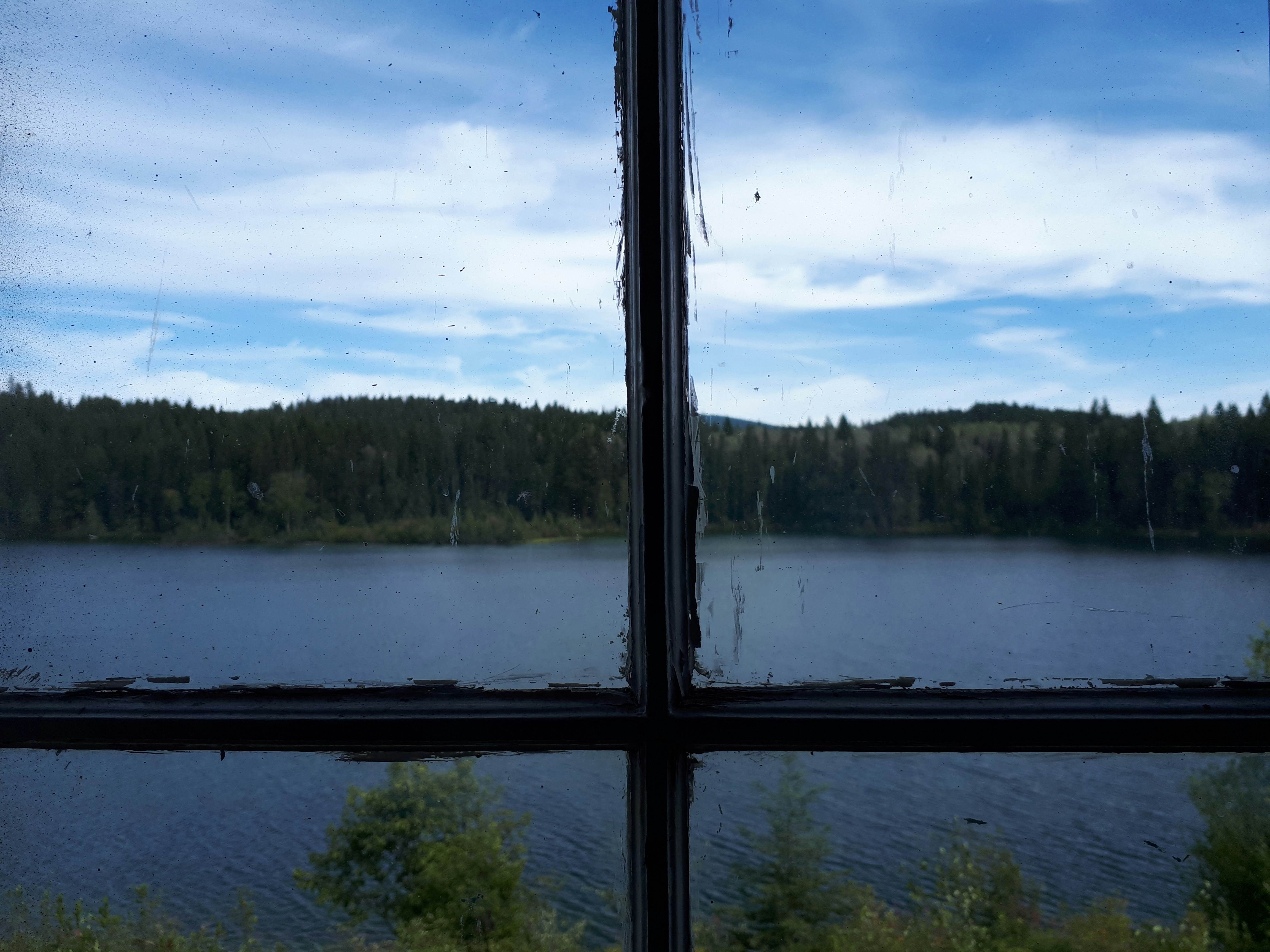 Centerframe Lakeview: Blue Sky Through a Weathered Windowpane