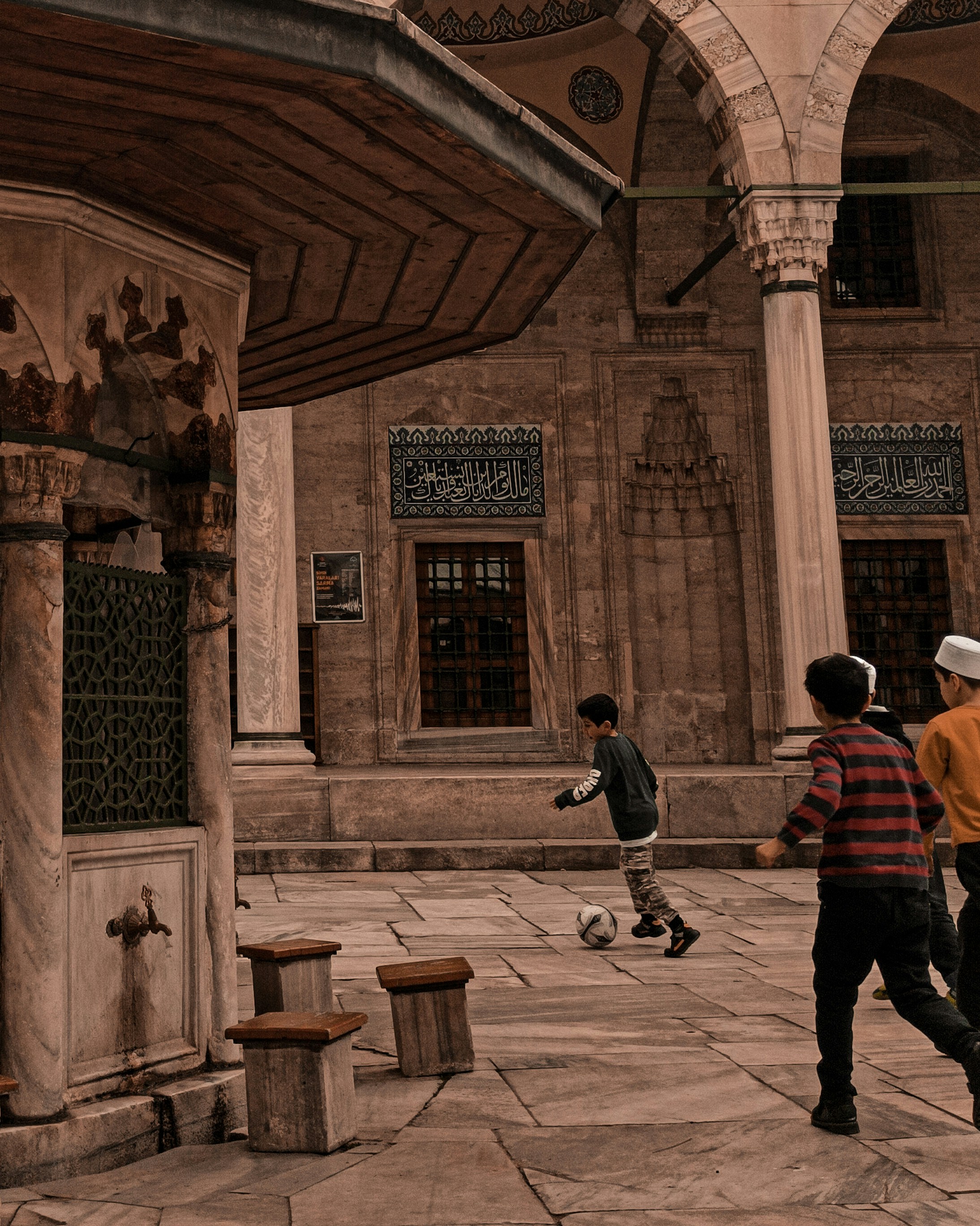 Sepia Courtyard Kick: A Small Game Among Ancient Arches