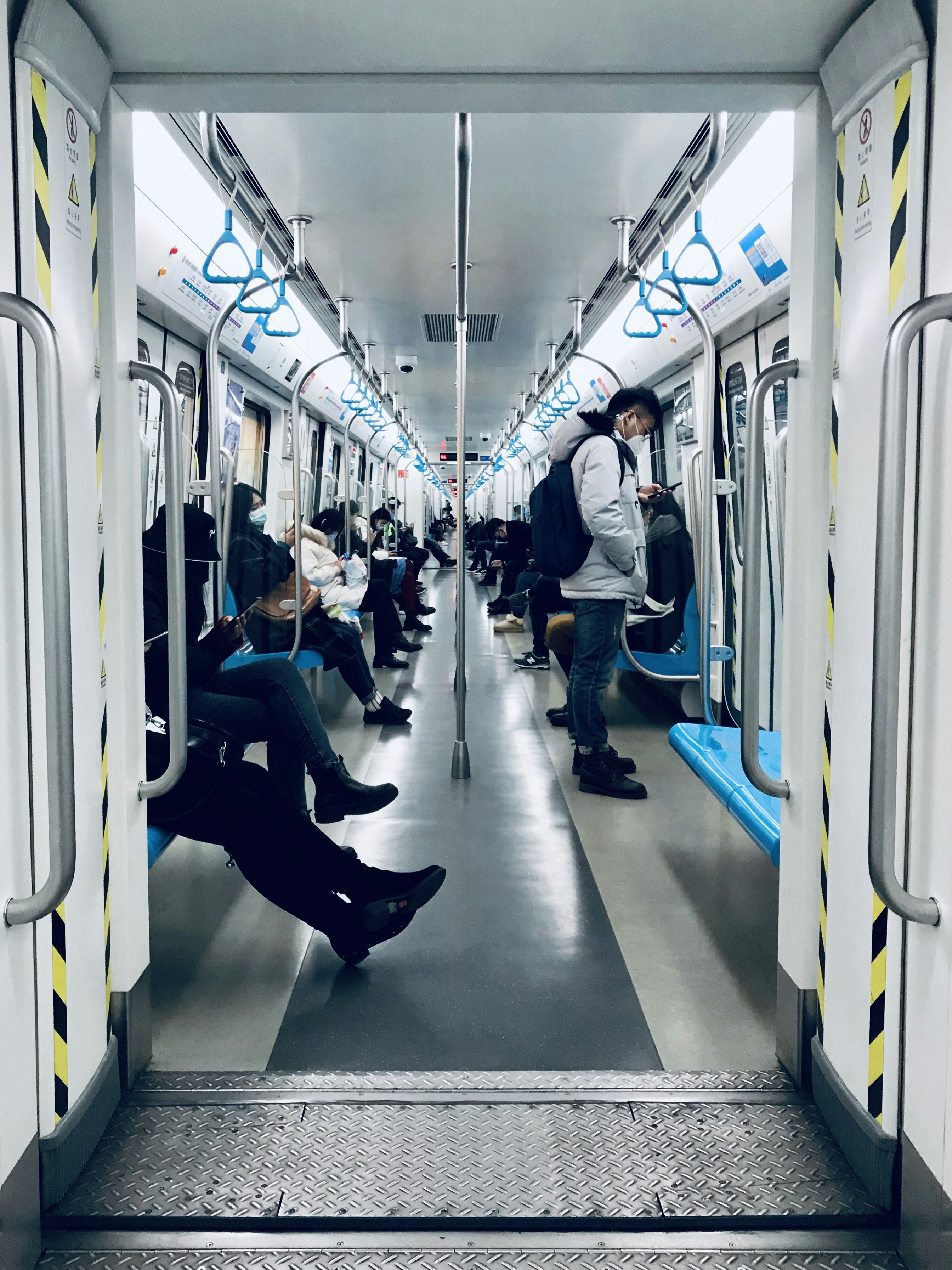 People sitting inside train during daytime photo – Free Black Image on ...