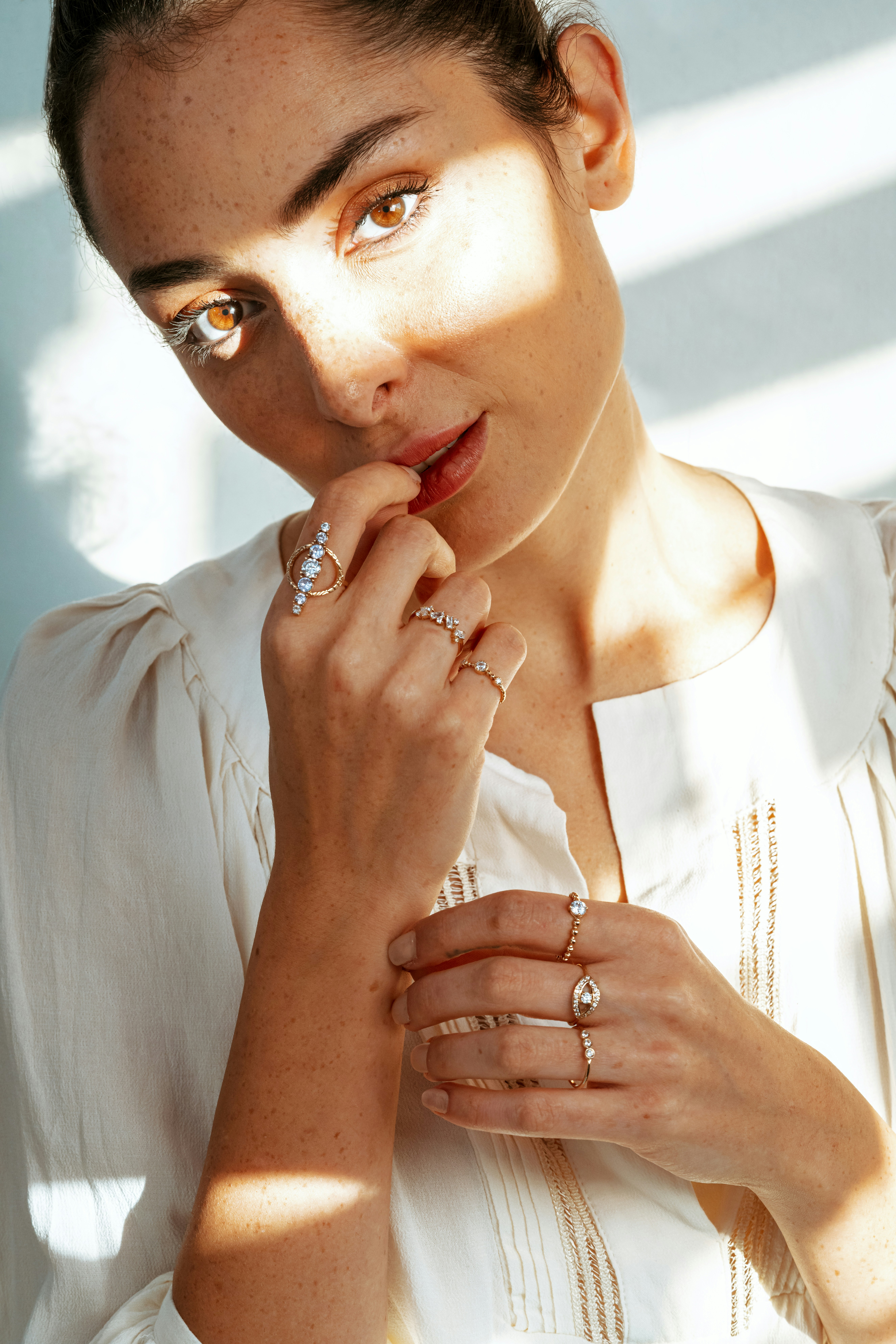 Woman in white long sleeve shirt wearing gold ring photo – Free Human ...