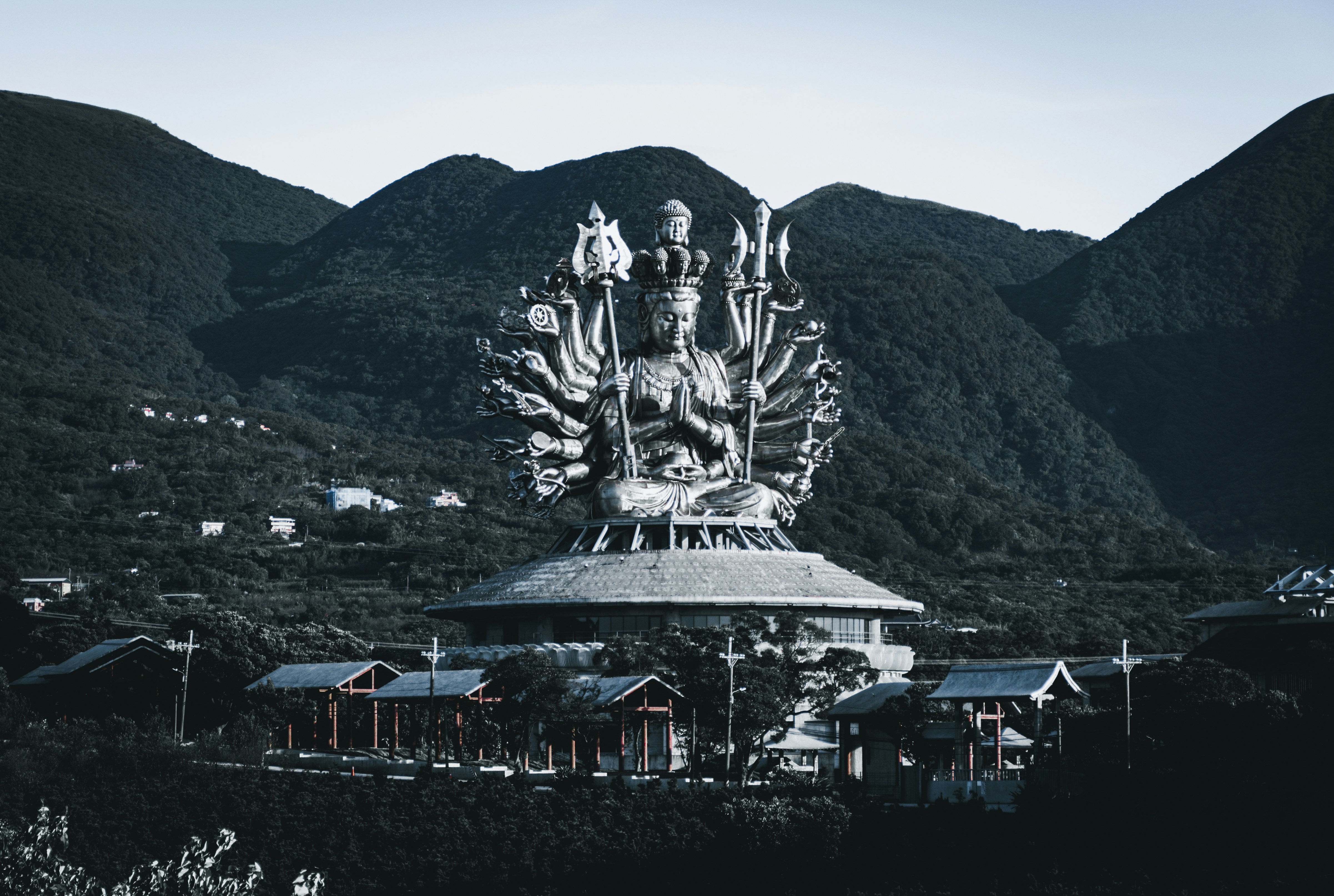 Majestic Peaks and Sacred Sculptures