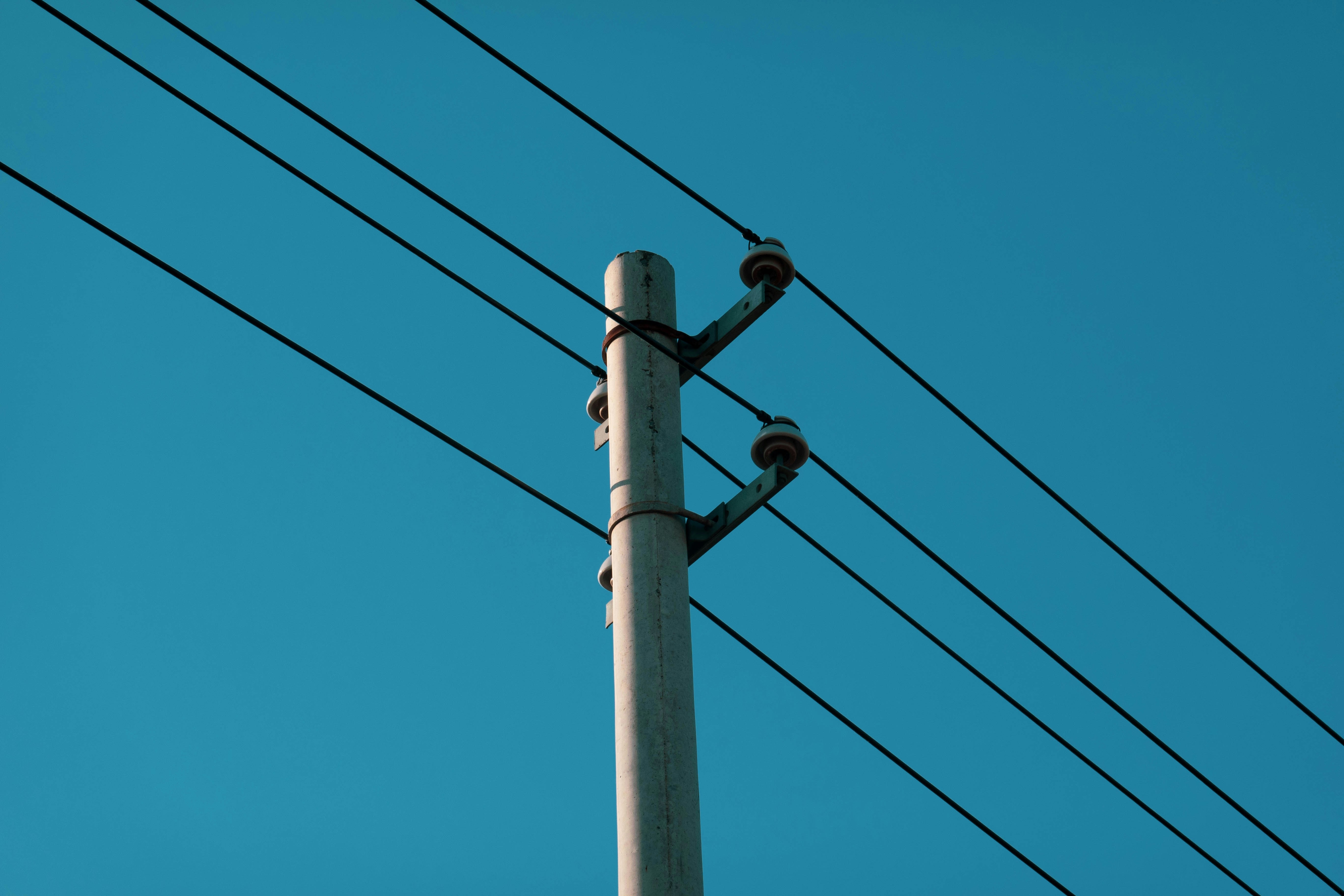 Gray electric post under blue sky during daytime photo – Free Grey ...