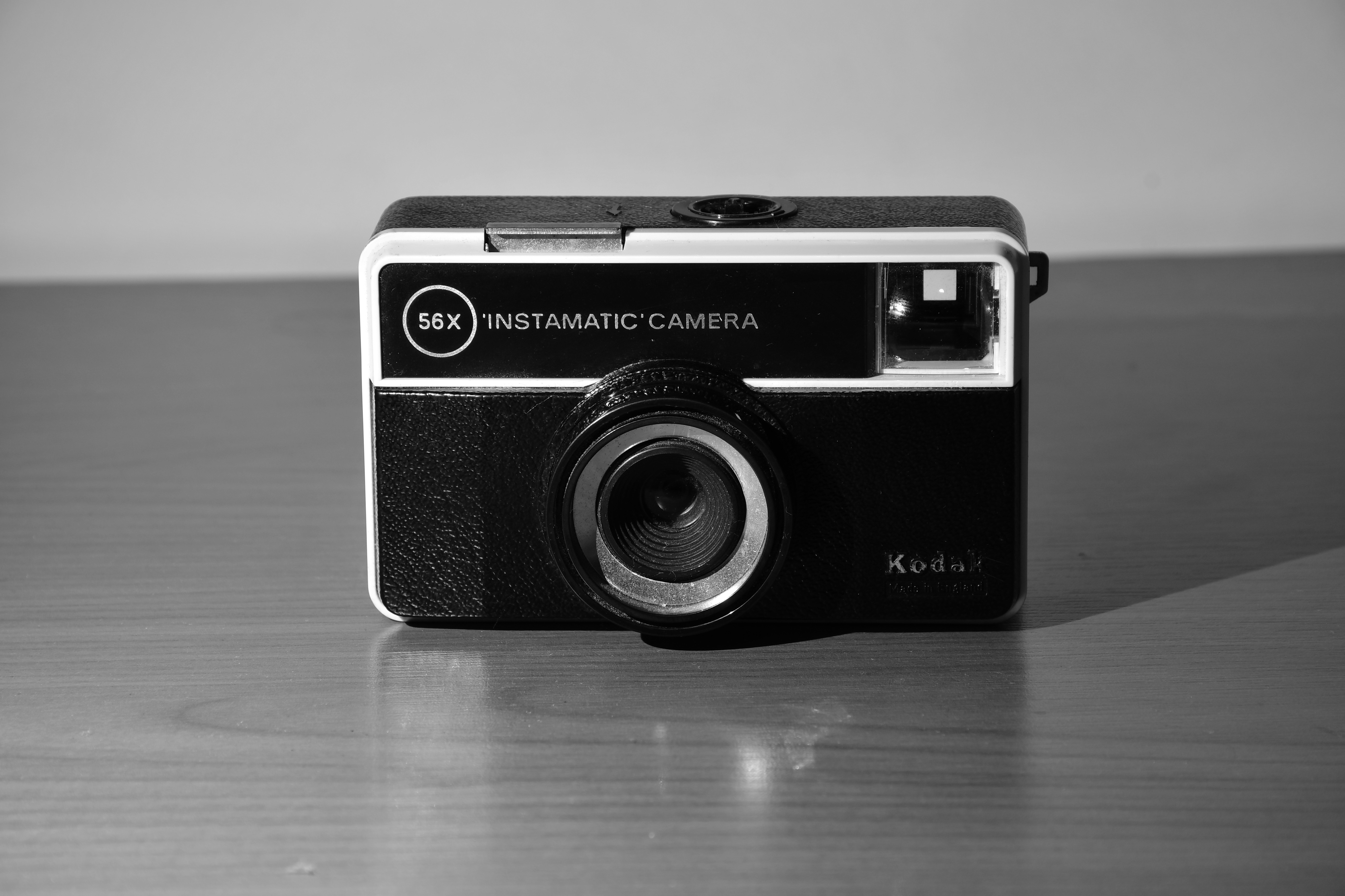 Mid-Century Kodak Instamatic: Quiet on a Wooden Table