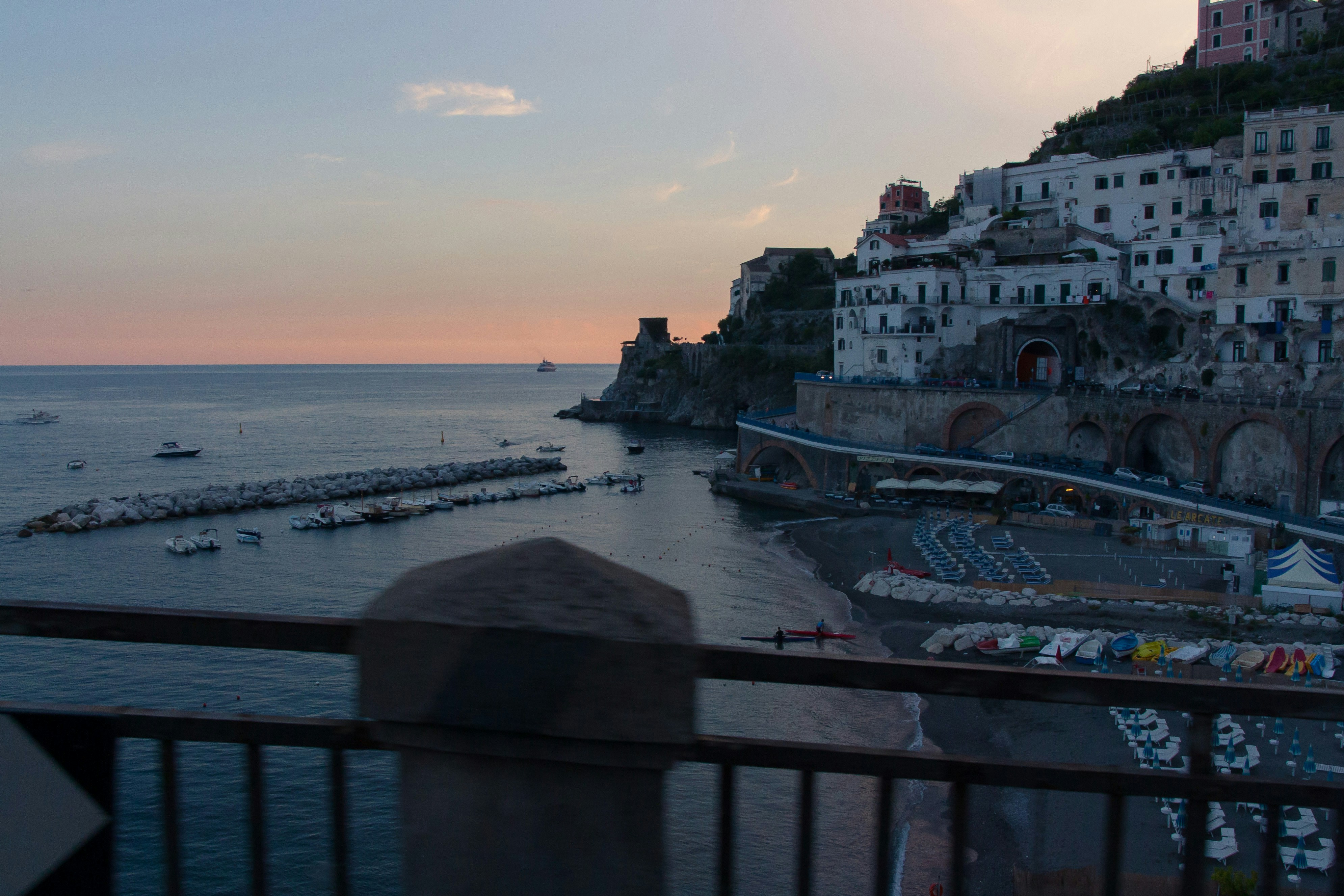 Dusk Over the Terraced Harbor: Whitewashed Facades Clinging to the Cliffs