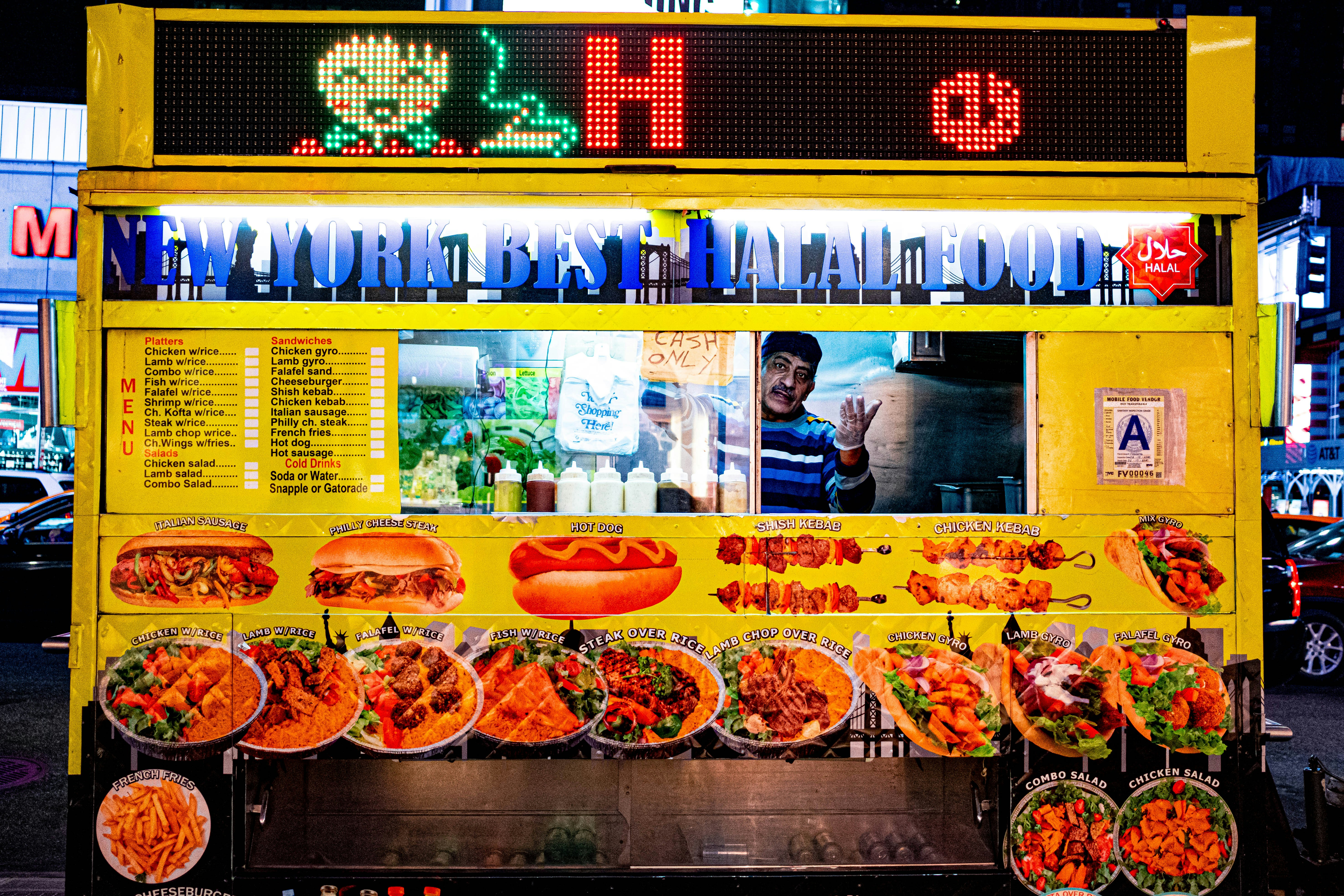 Street Food Stall on a Bright Evening: Colorful Fanfare of New York Halal Food