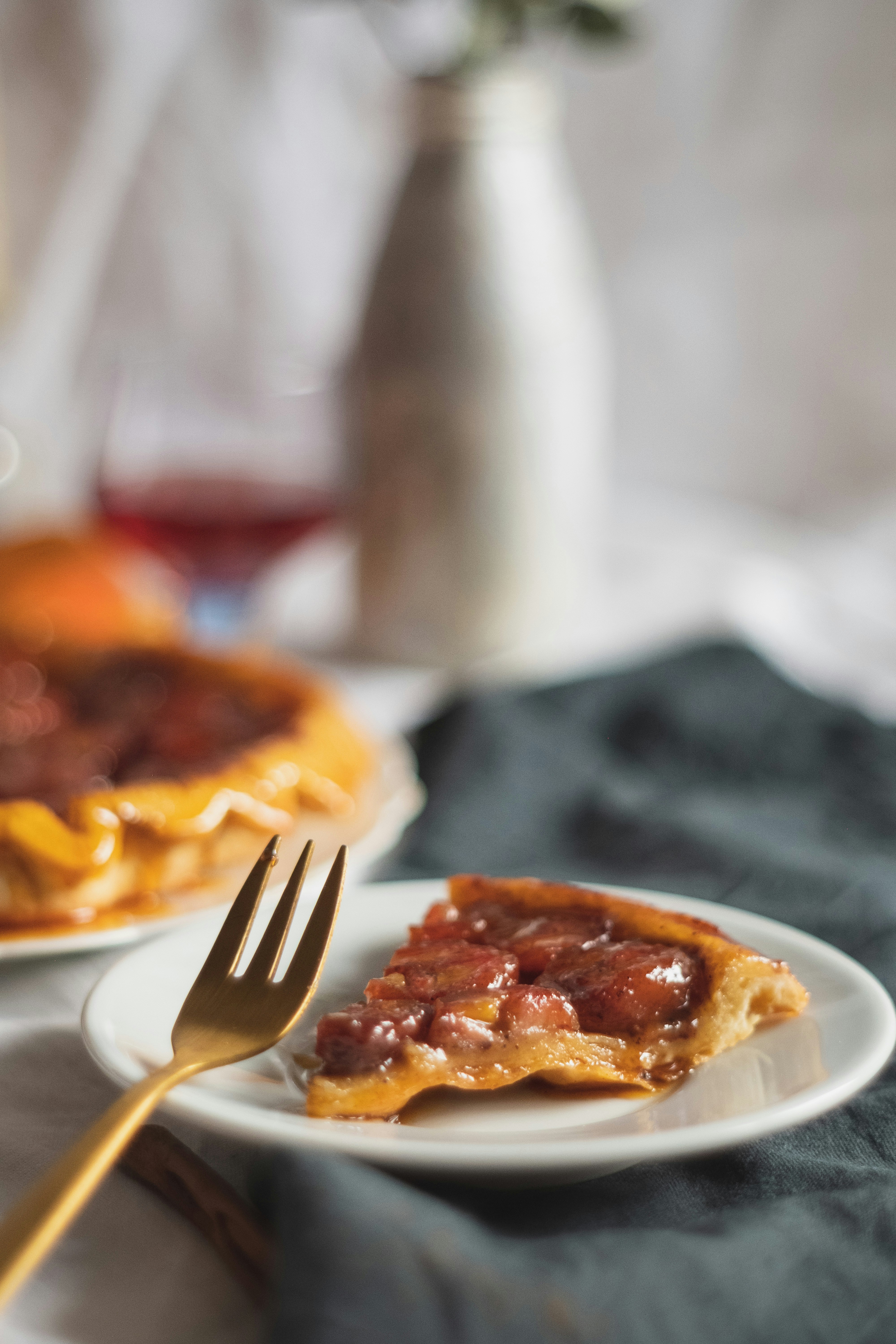 Cherry-Glazed Slice in Soft Focus: A Quiet Dessert Moment