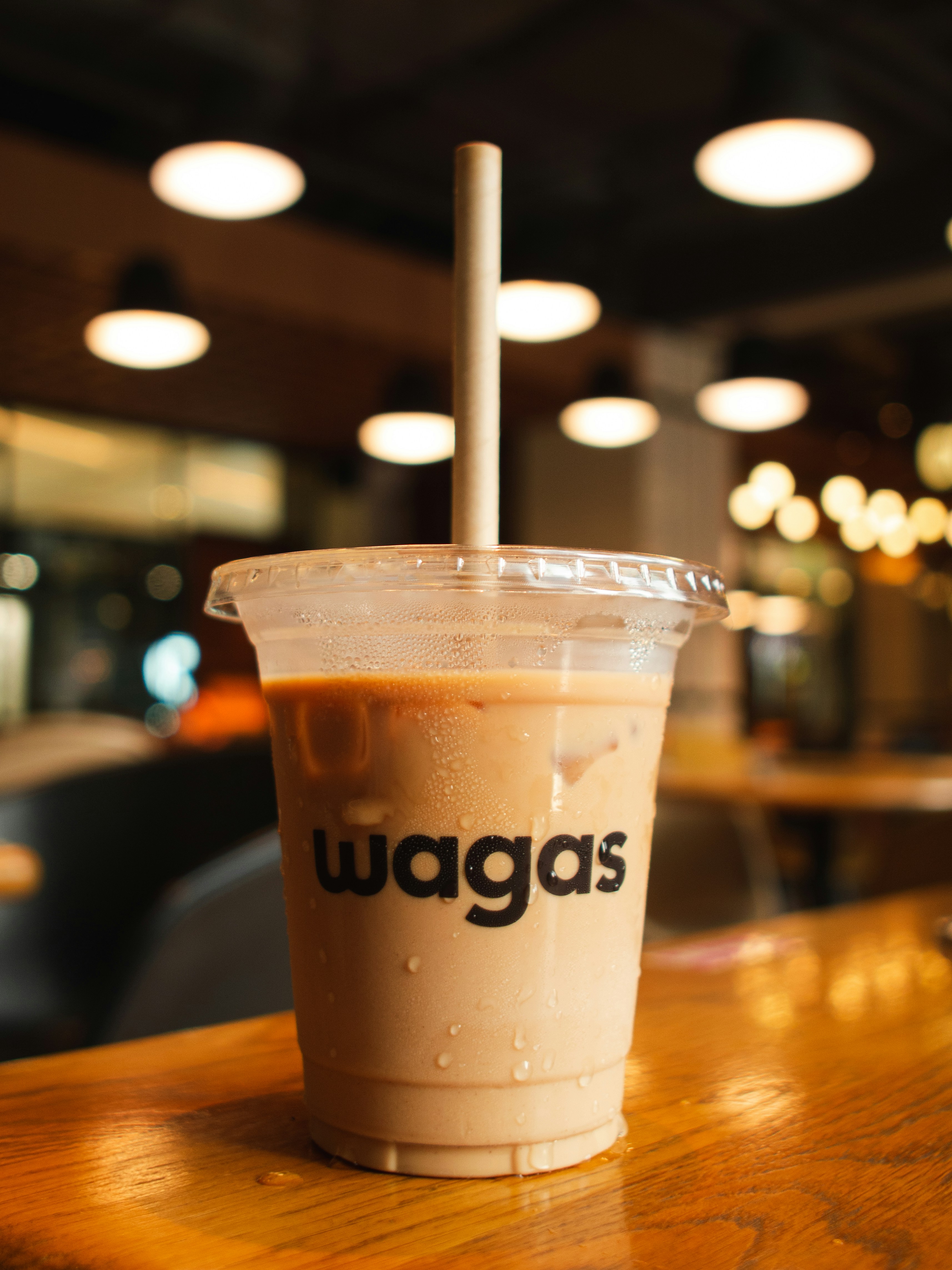 Dunkin donuts coffee cup on brown wooden table photo – Free Food Image ...