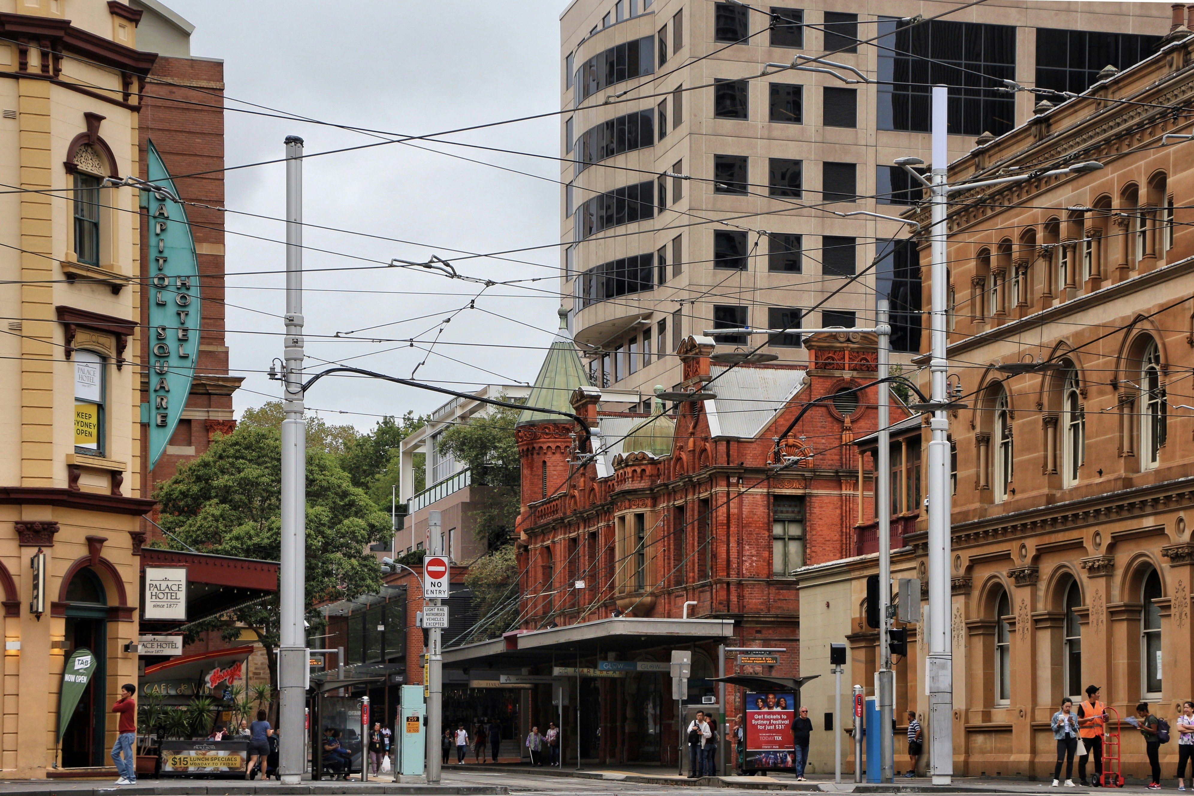 Brown concrete building near street light during daytime photo – Free ...