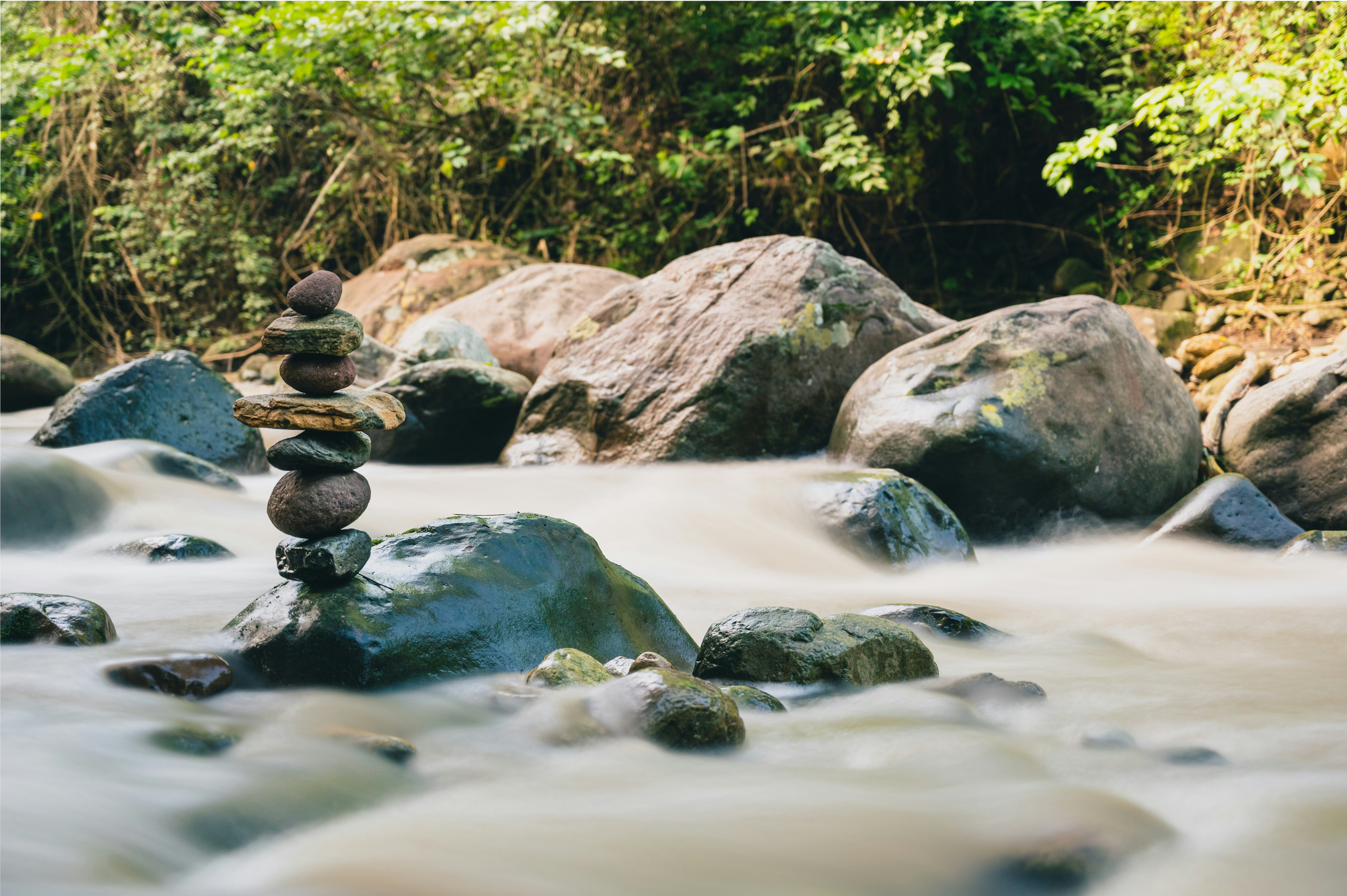 Black stones on river during daytime photo – Free Grey Image on Unsplash