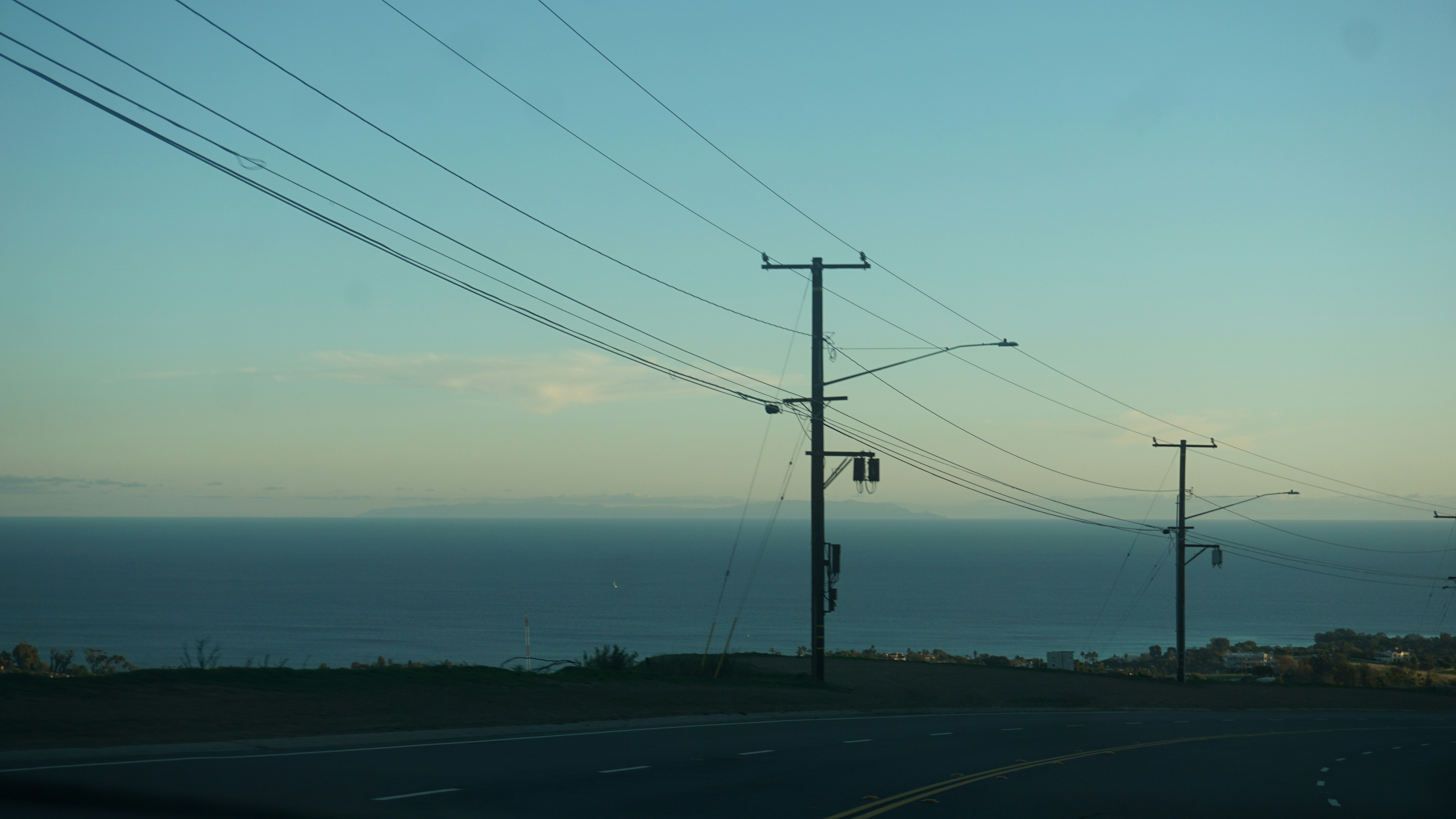 Coastal Road under Quiet Skies