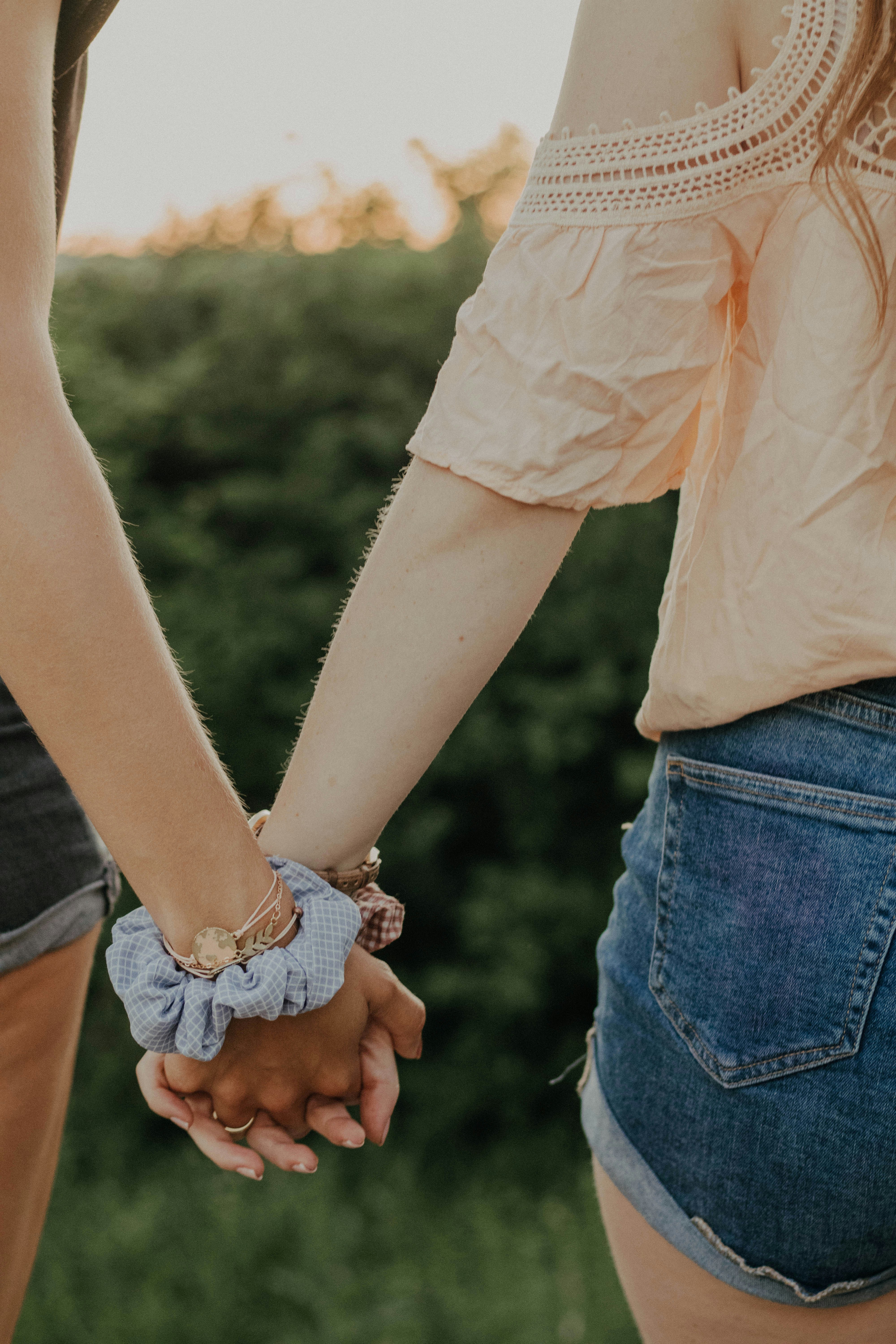 Two Best Friends Holding Hands