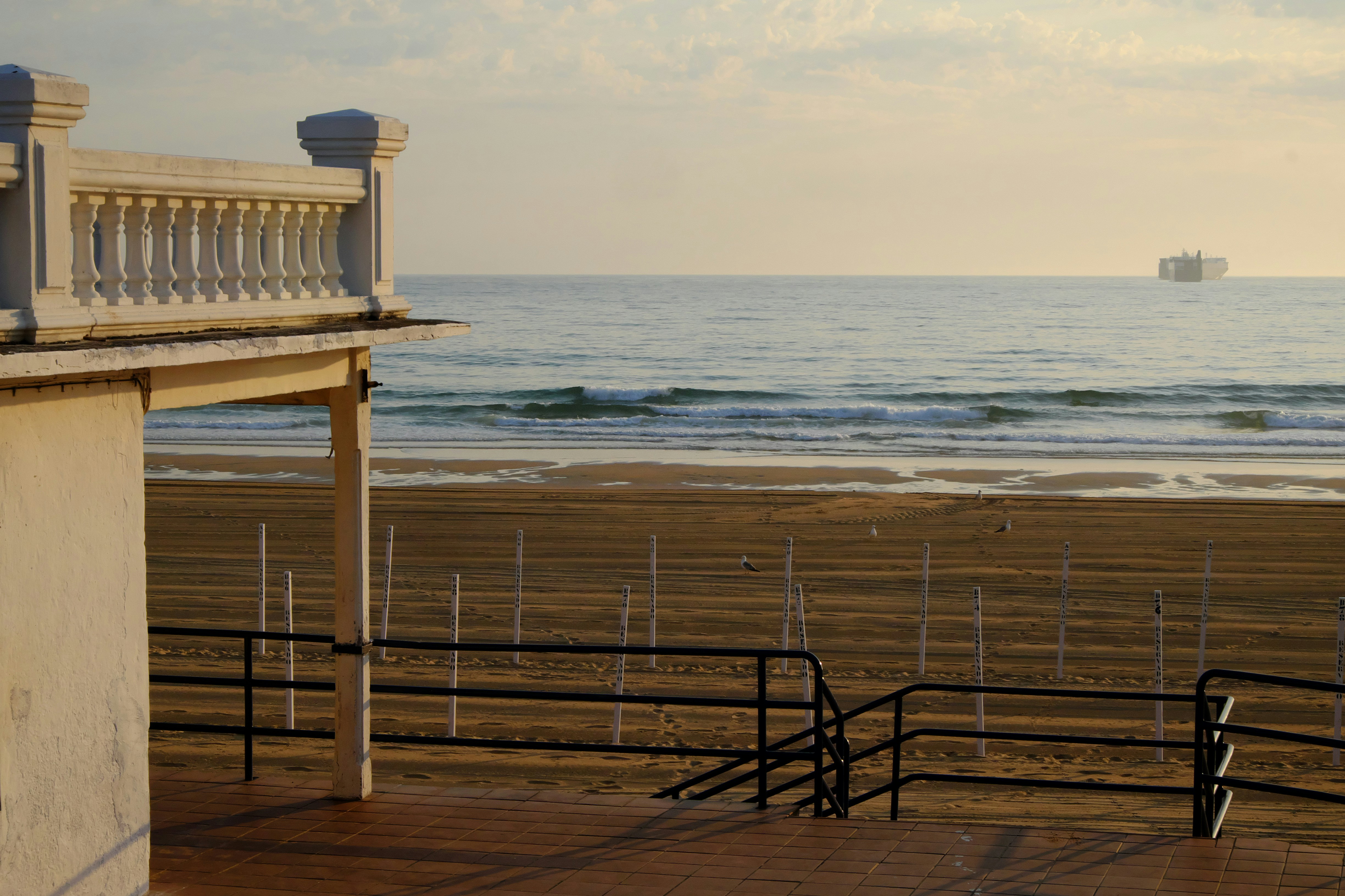 Sunlit Terrace Framing the Sea: A Quiet Coastal Moment