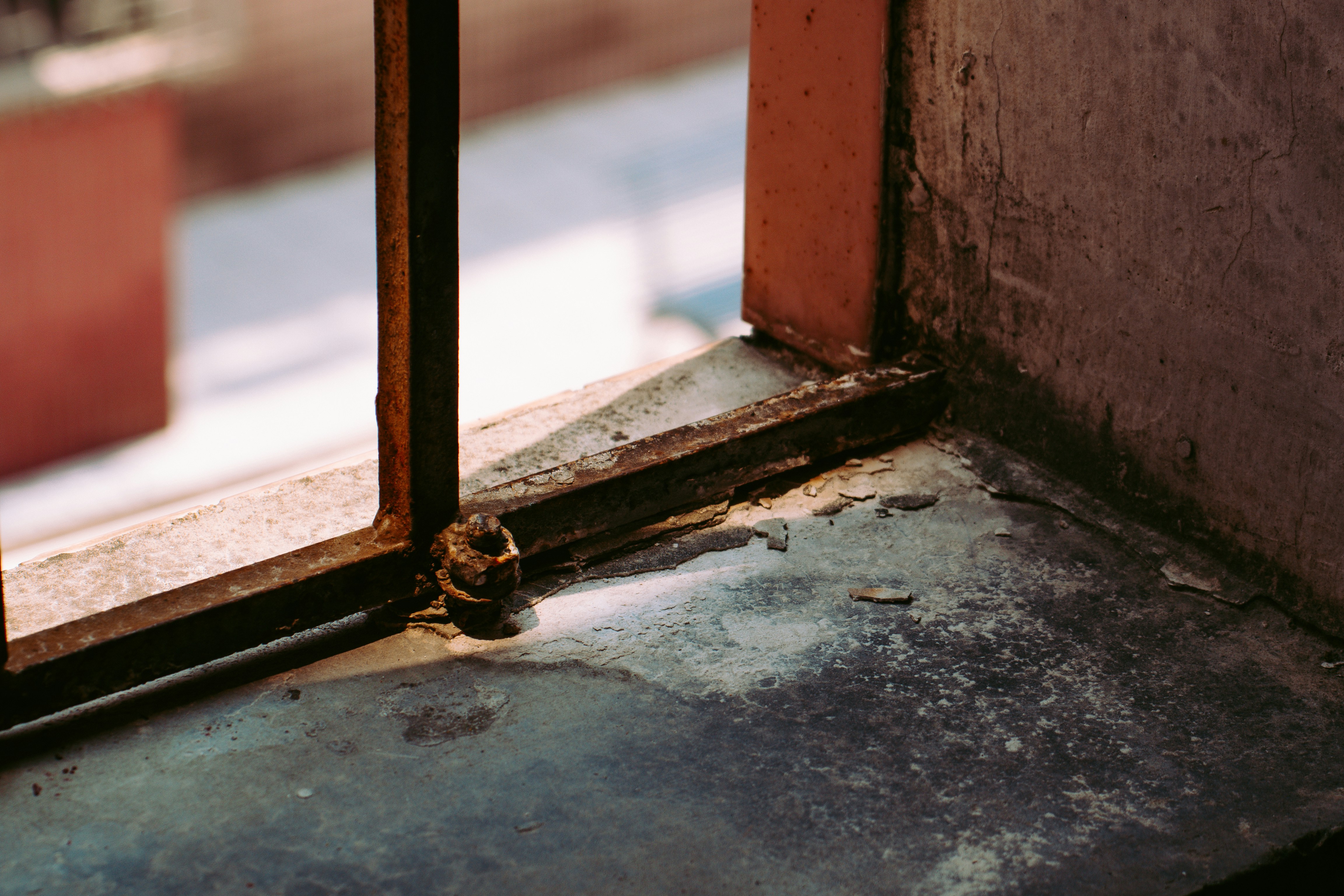 Rust at the Window Sill: A Quiet Corner of Light and Decay