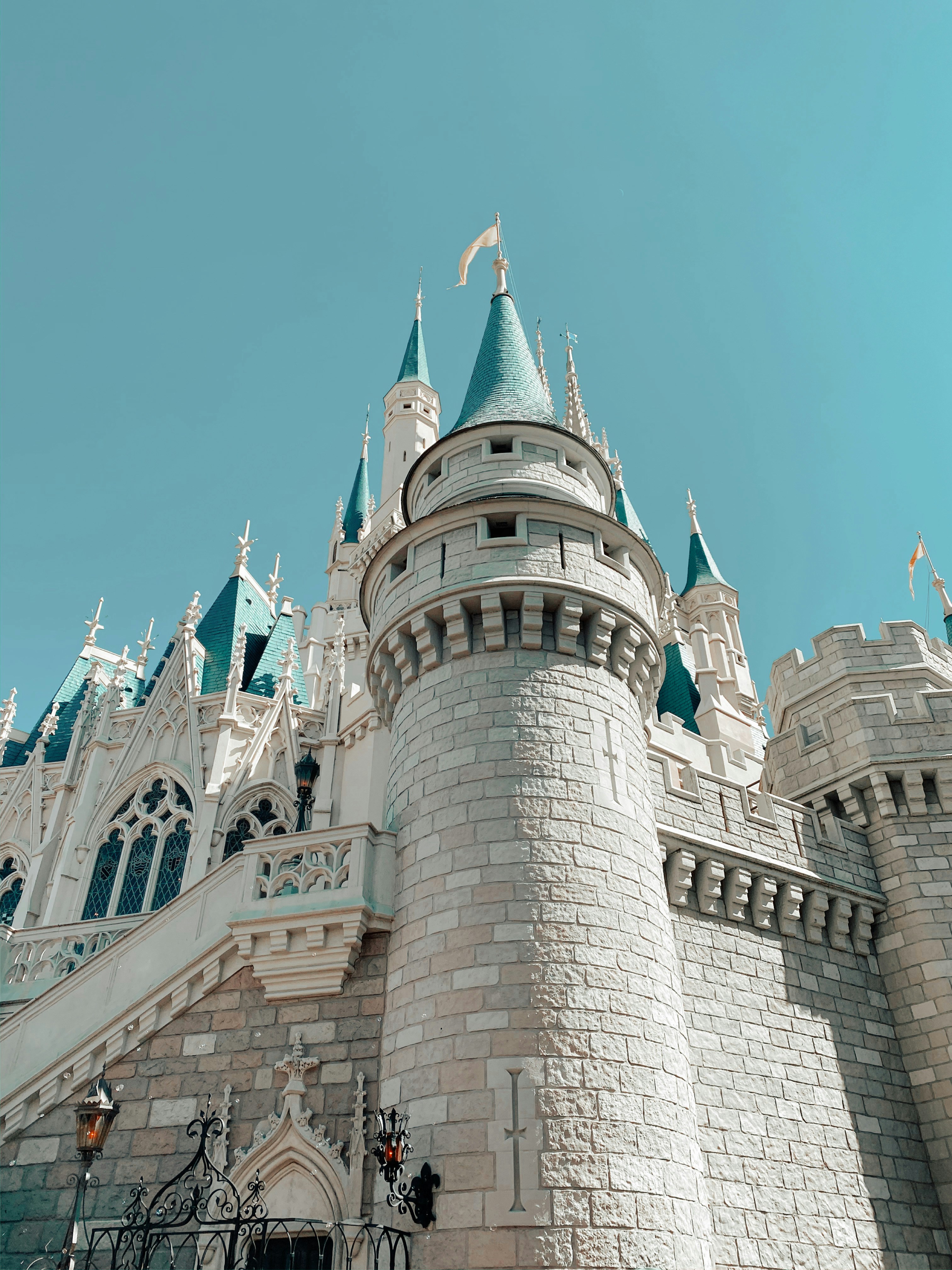 White and blue concrete castle under blue sky during daytime photo ...