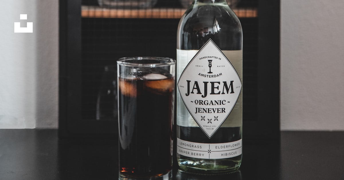 Black Glass Bottle Beside Clear Drinking Glass Photo Free Nederland