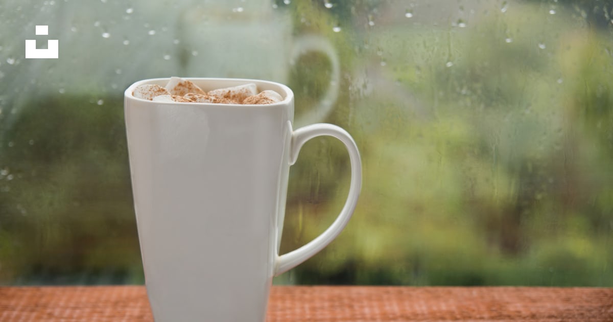 Tasse En Céramique Blanche Avec Liquide Brun à Lintérieur Photo