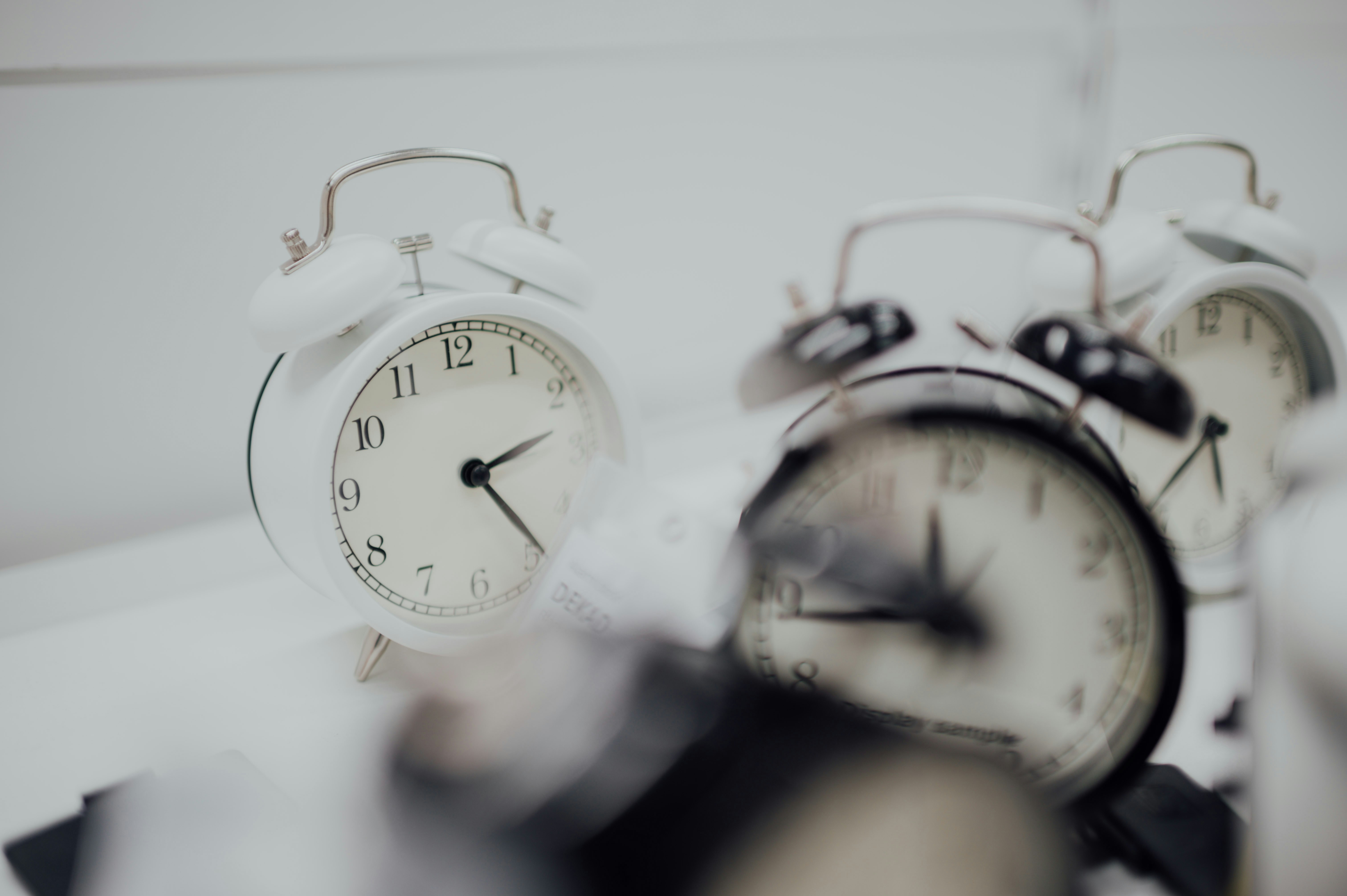 White alarm clock at 10 00 photo – Free Building Image on Unsplash