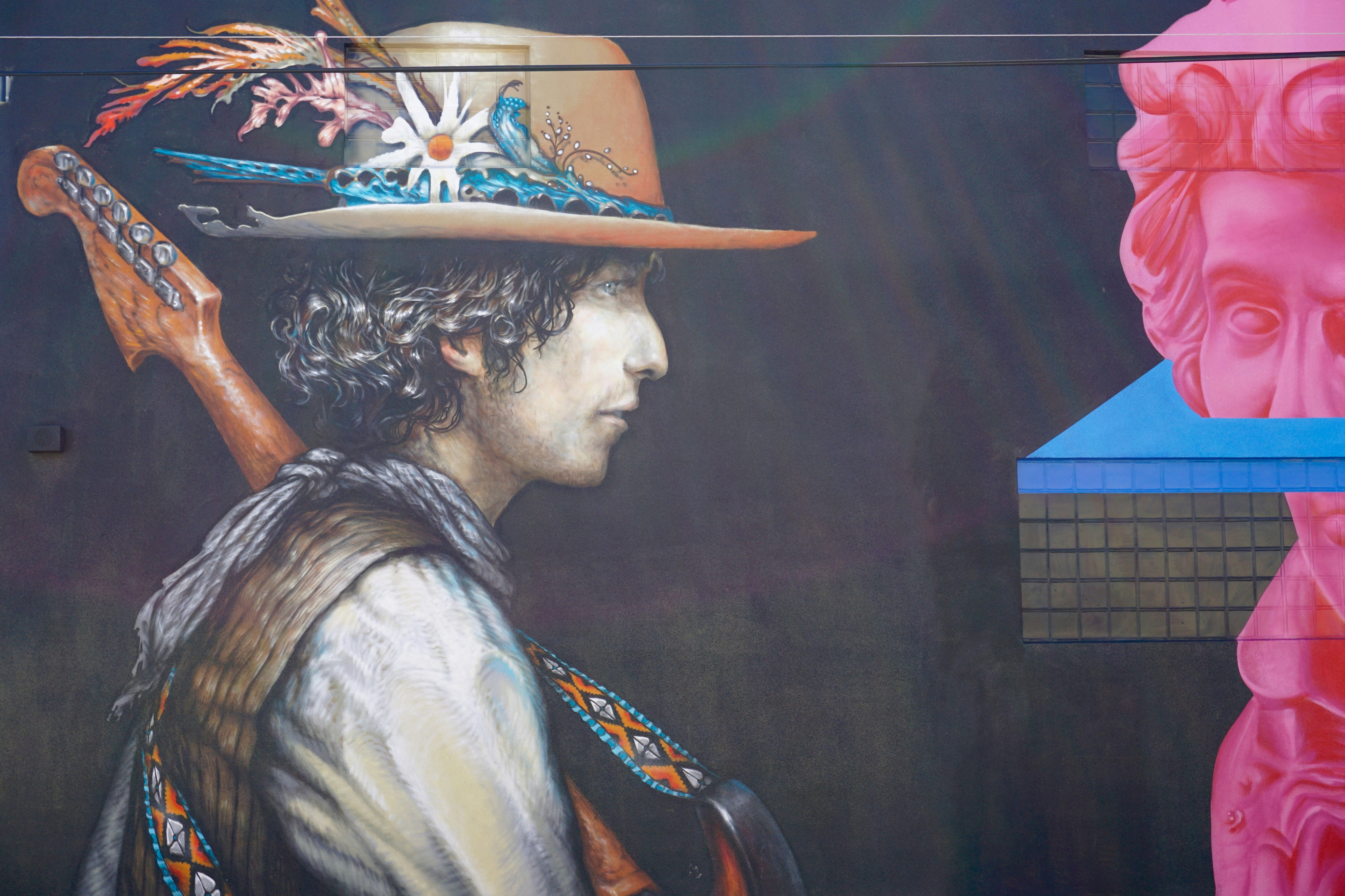 Portrait of a Street Troubadour: A Painted Gaze in the Graffiti Gallery