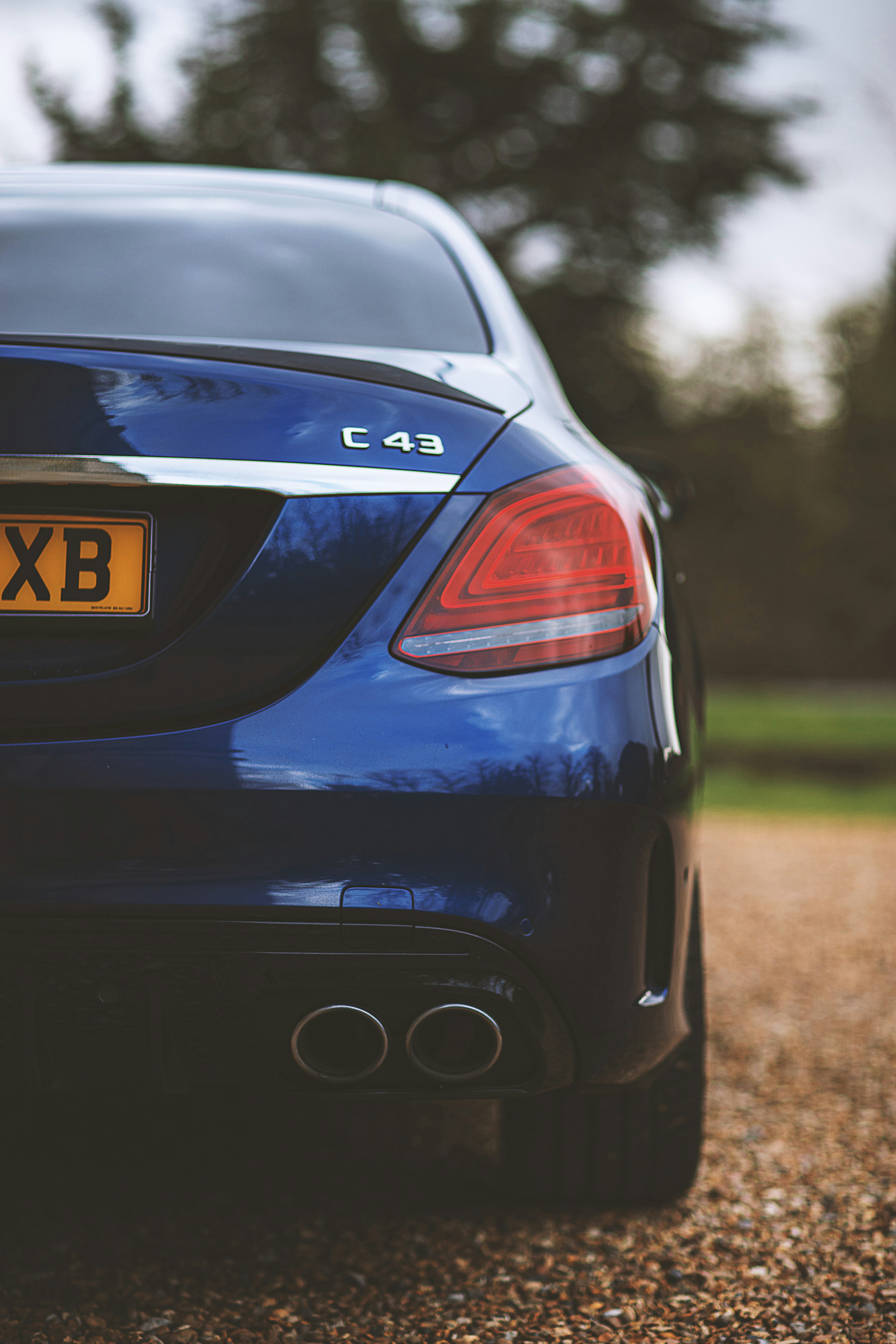 Blue car on green grass field during daytime photo – Free Woburn Image ...