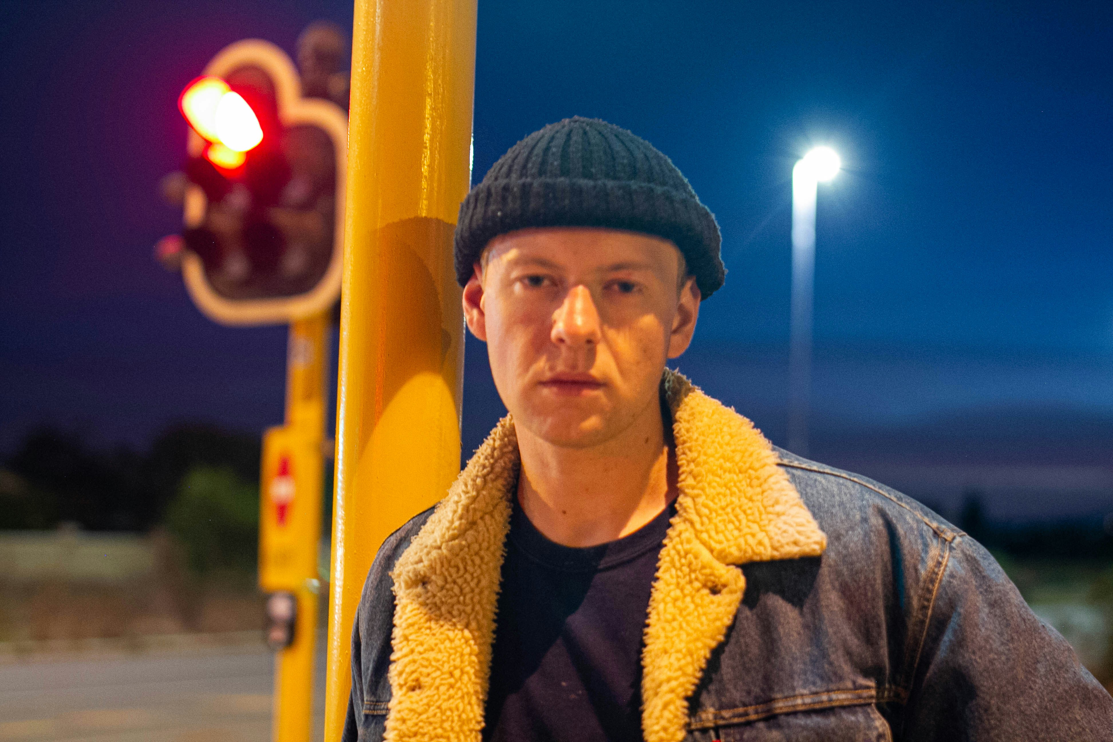 Night Crossing: A Portrait under Streetlight Silence