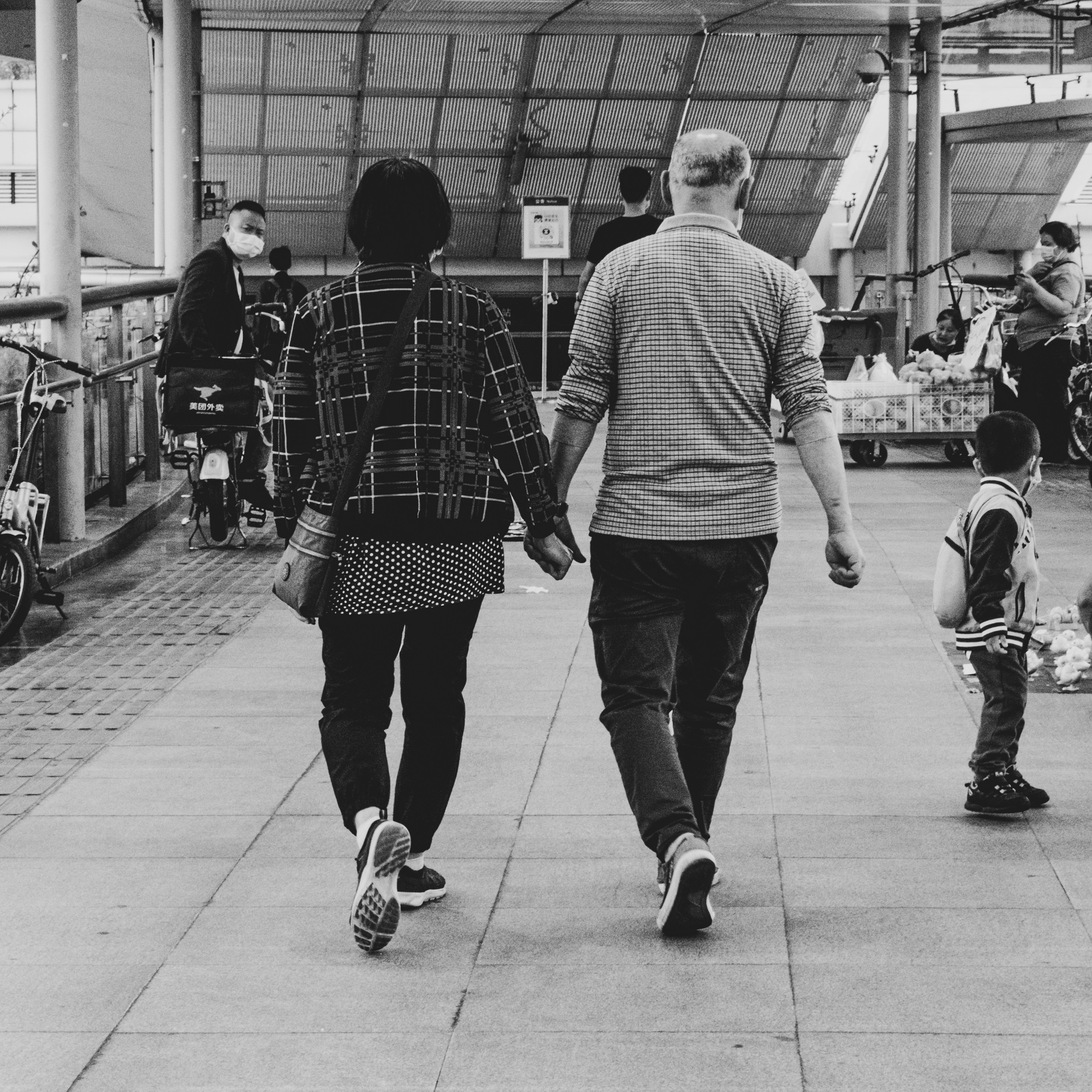 Man in black and white checkered dress shirt and black and white ...