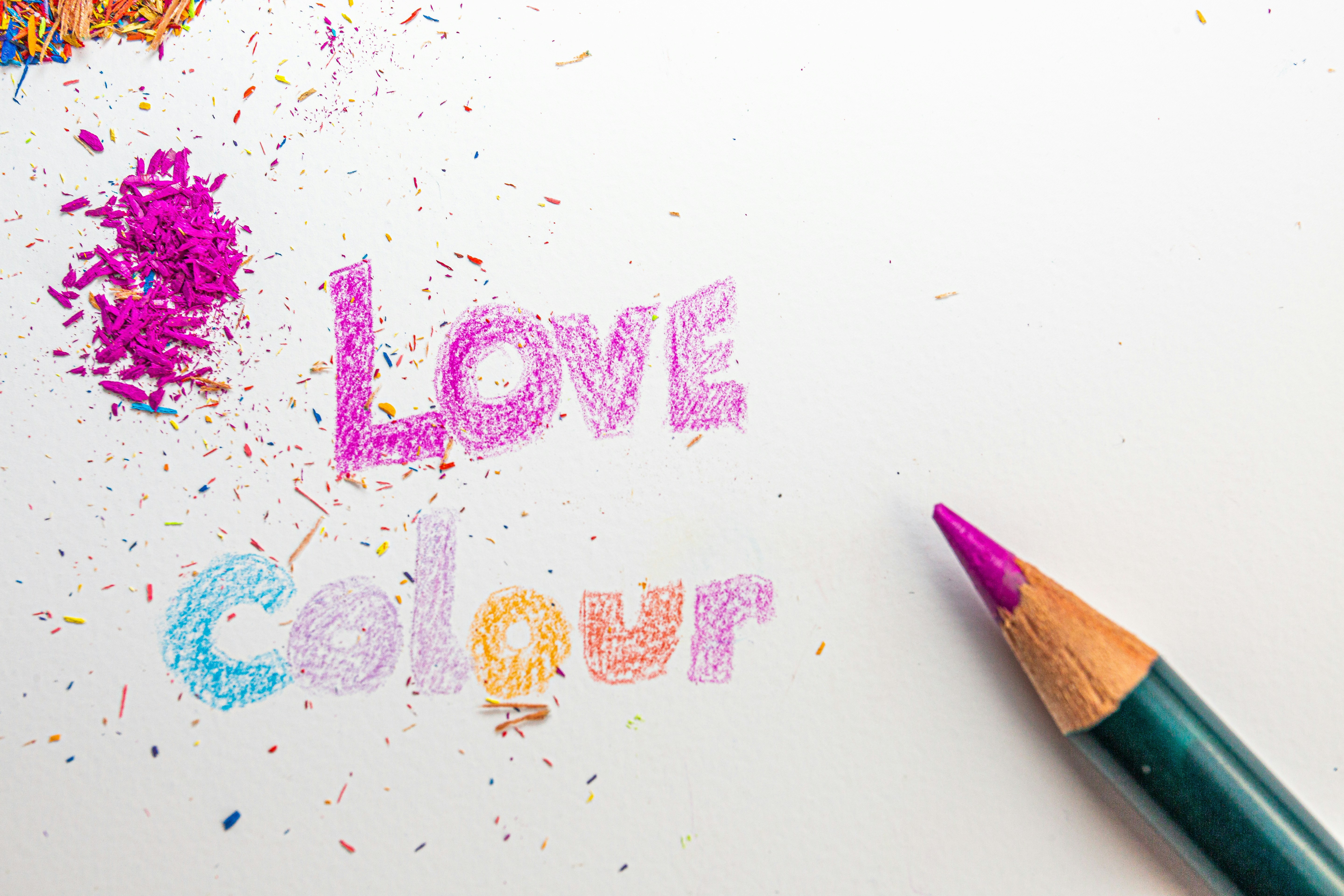 Colorful Confetti Script: Love Color on White Canvas