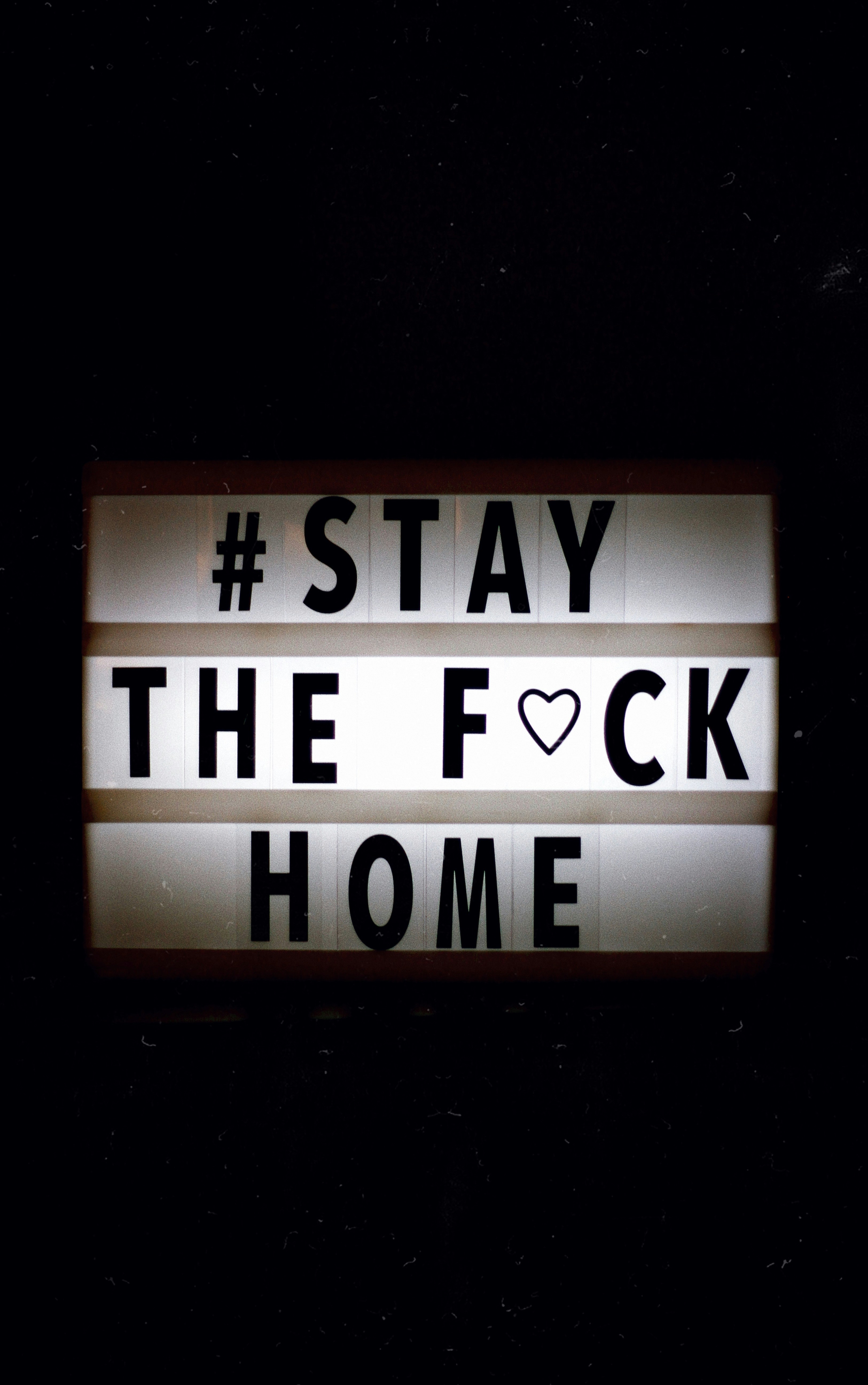 Lightbox Echoes: Stay Home Message Centered in Night Darkness