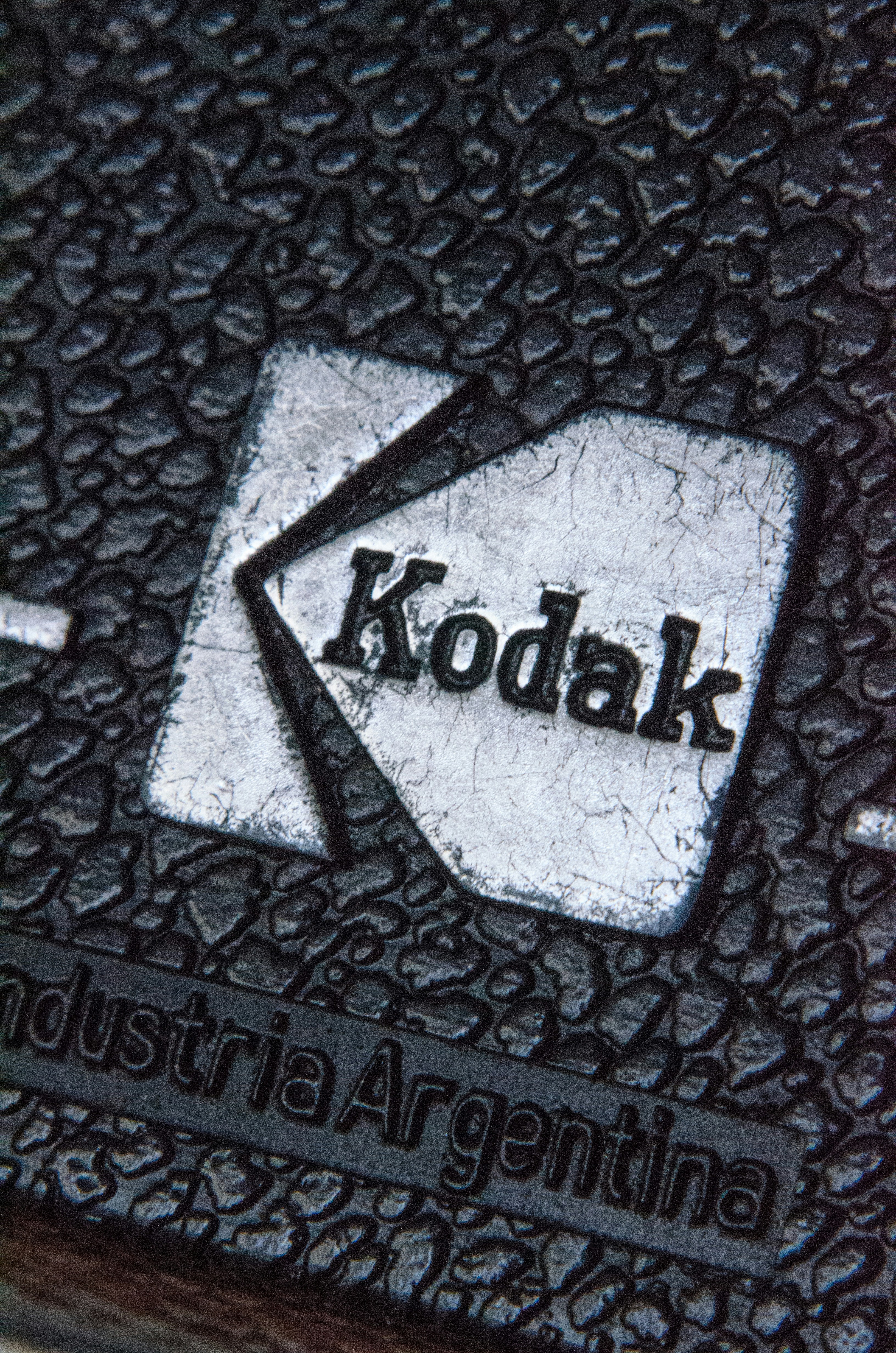 A close up of a kodak logo on a black background photo – Free Buenos ...