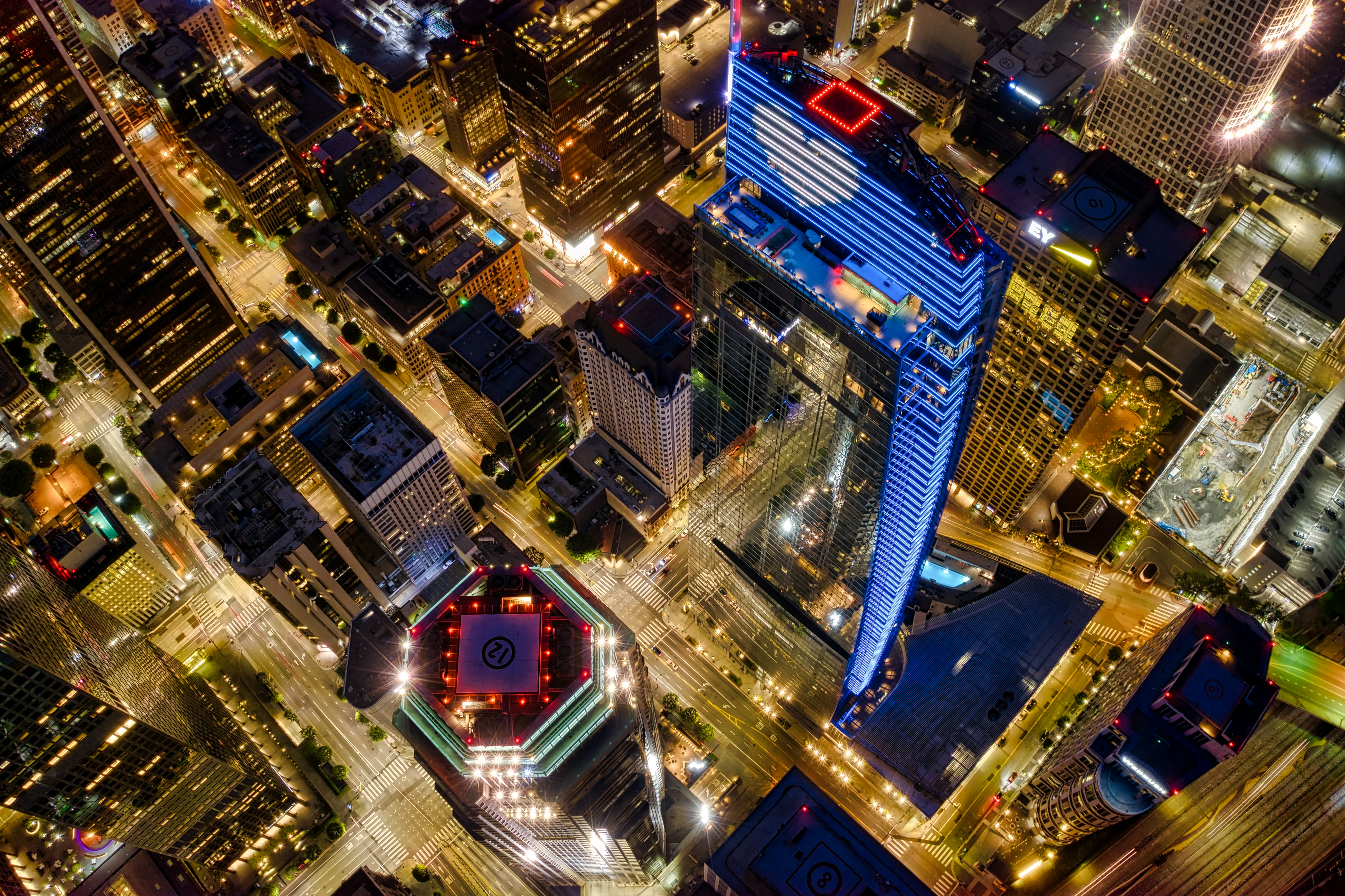 Aerial view of city buildings during night time photo – Free Building ...
