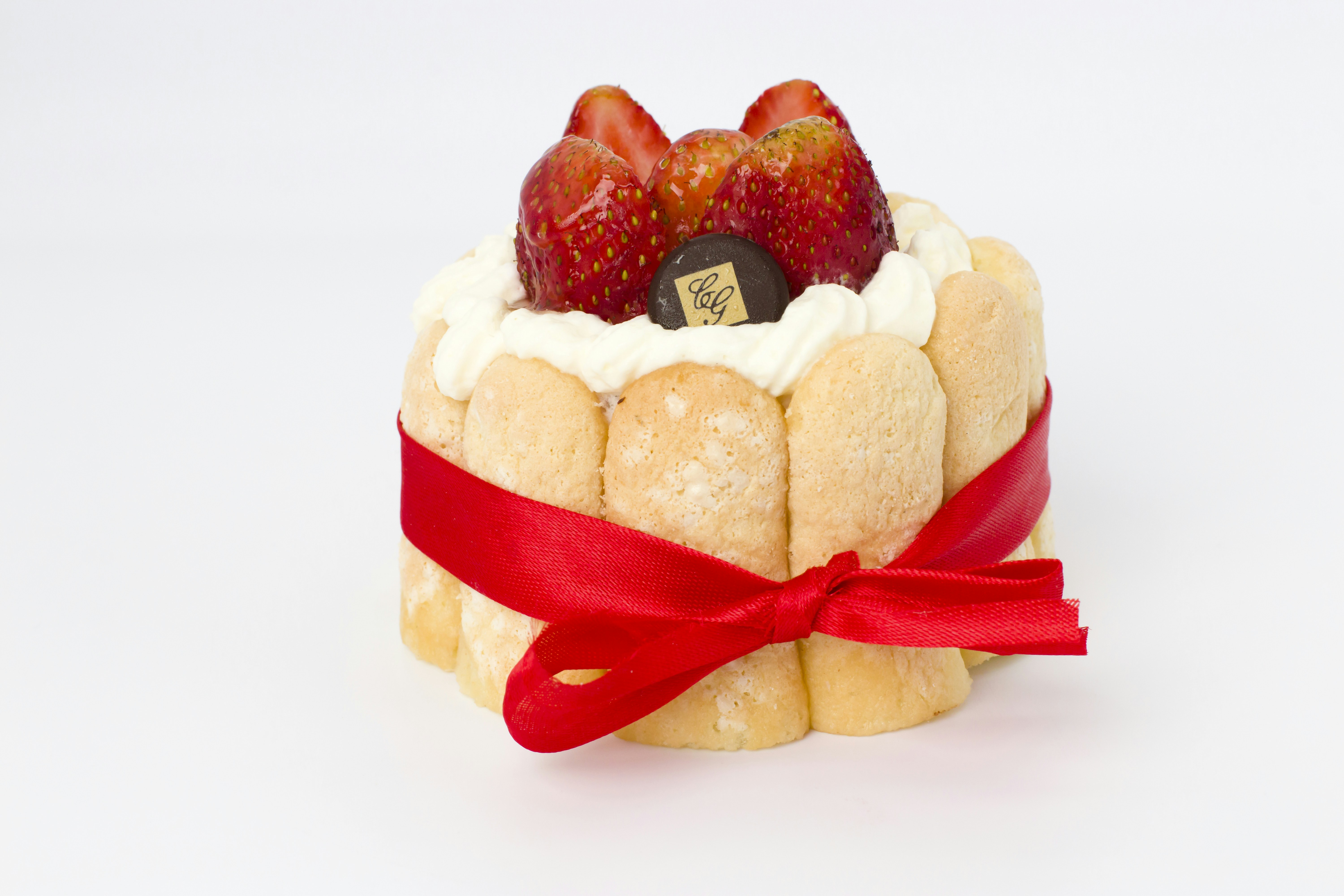 brown and red bread with red ribbon