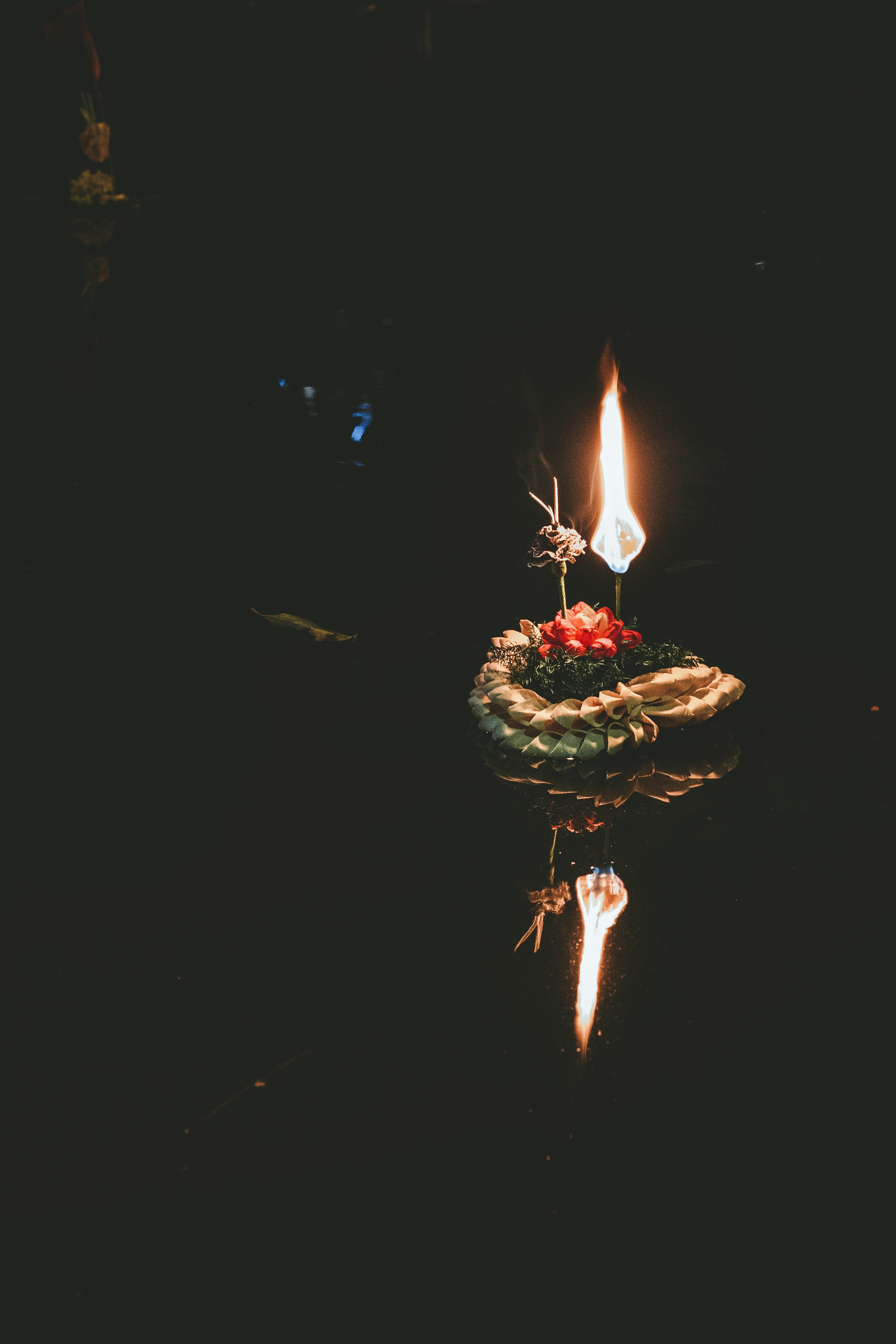 green and red fruit with fire