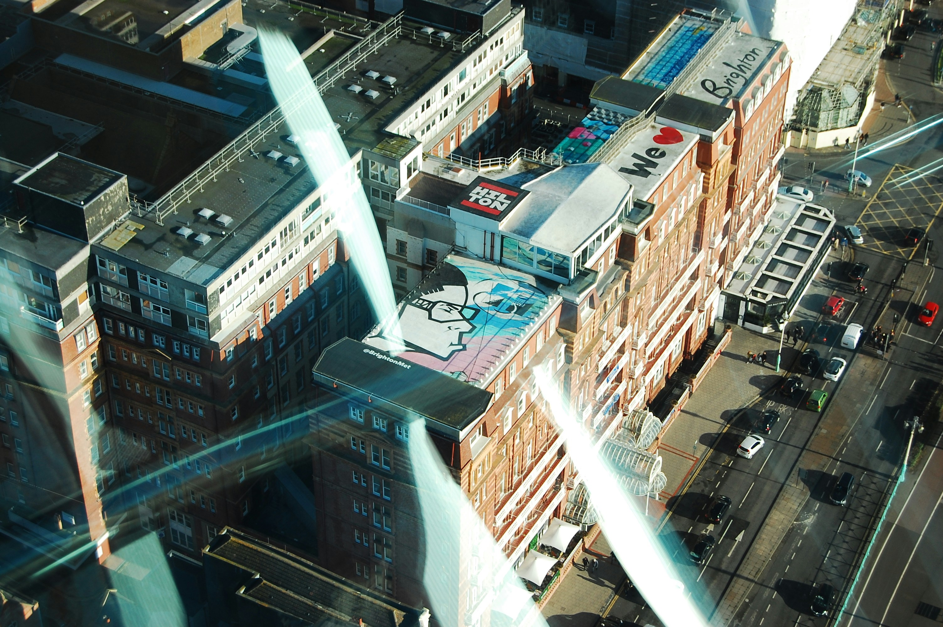 Urban Canvas: Aerial Artistry Over City Streets