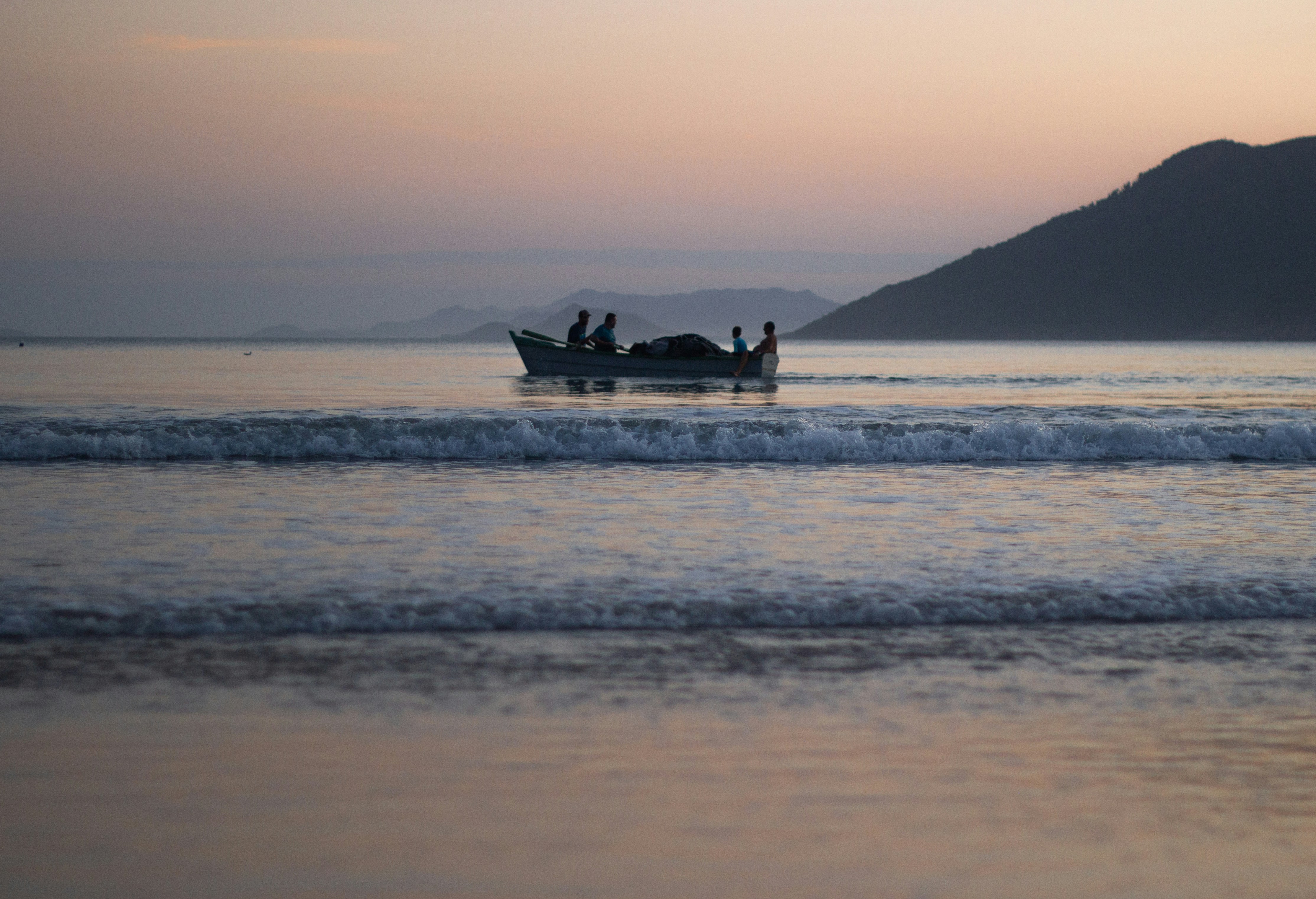 Dusk Vessel: A Quiet Boat Treads the Velvet Sea