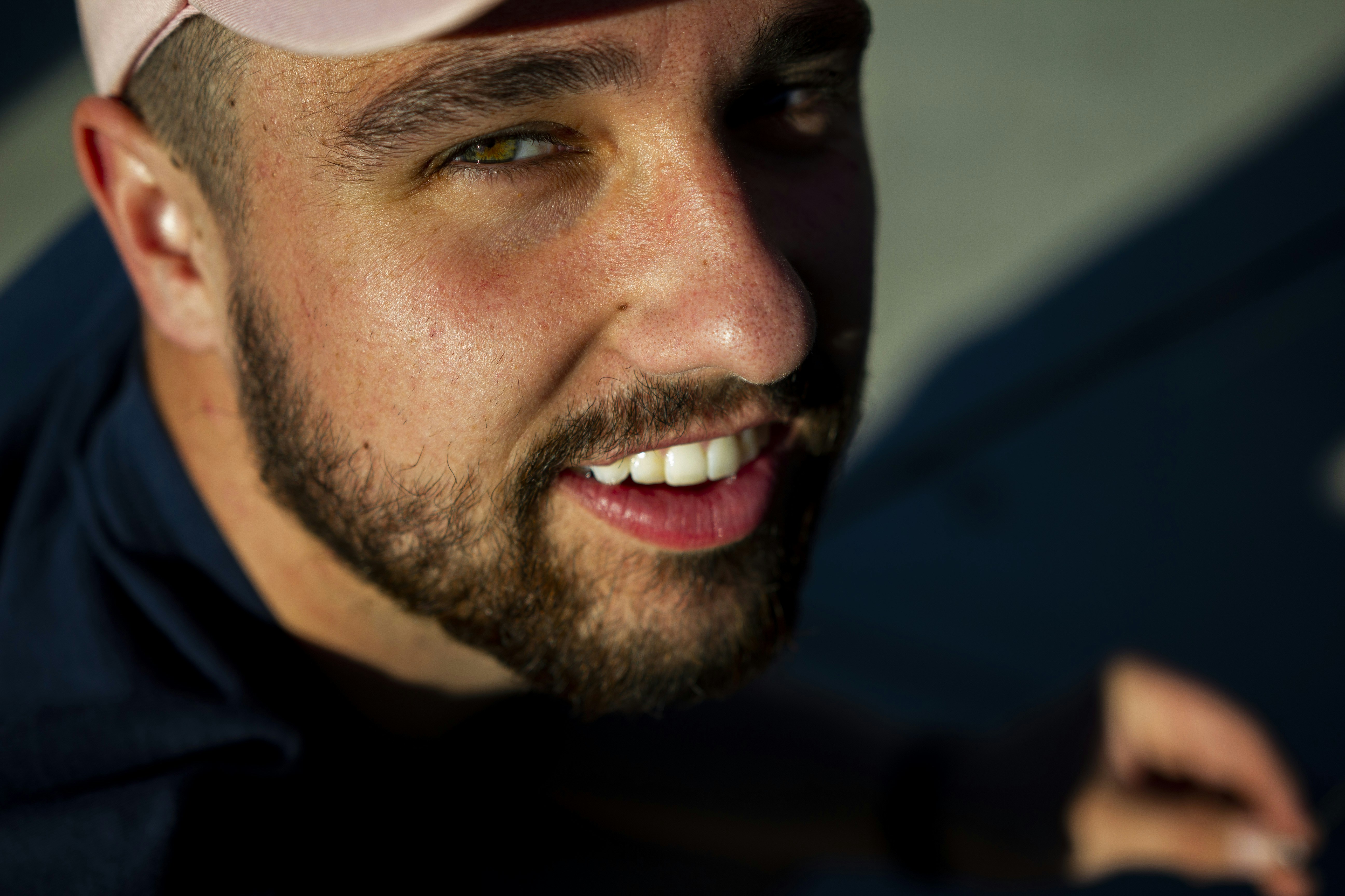 Quiet Gaze in Warm Light: A Close-Up Portrait of a Bearded Man