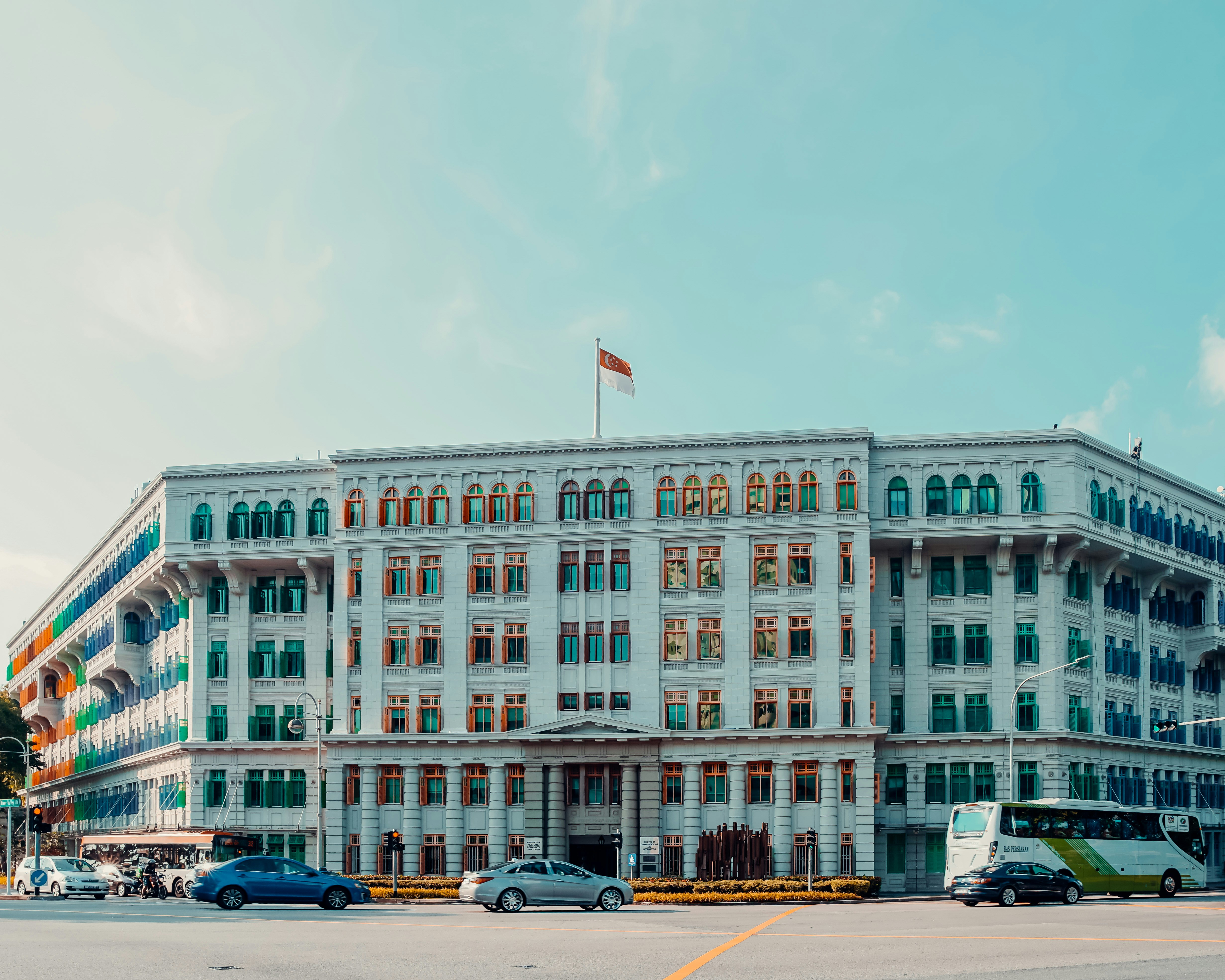 Historic building with 927 windows in vibrant colors under a clear sky.