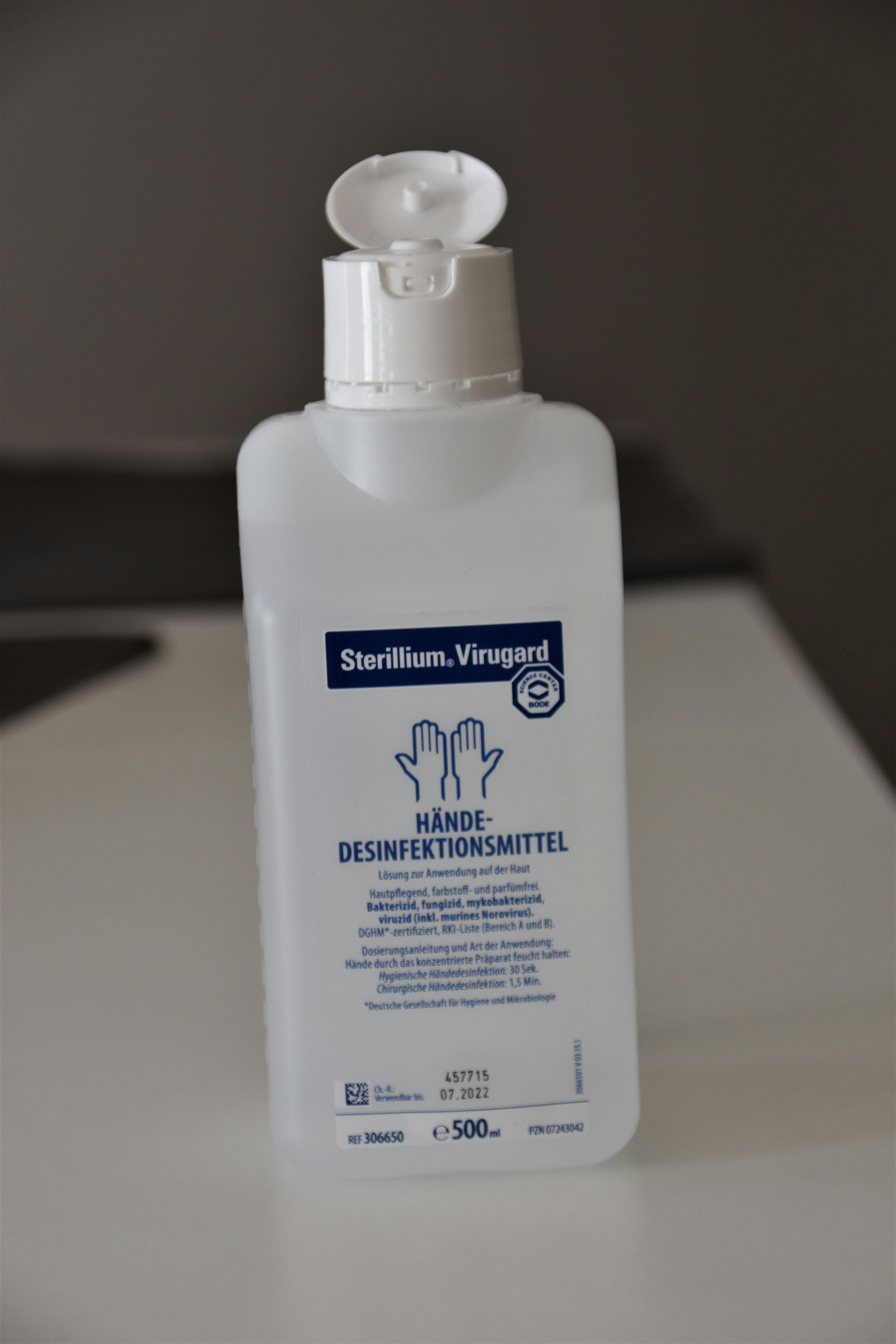 Hand Disinfectant against Corona Virus covid-19 | nivea sun lotion bottle on white table