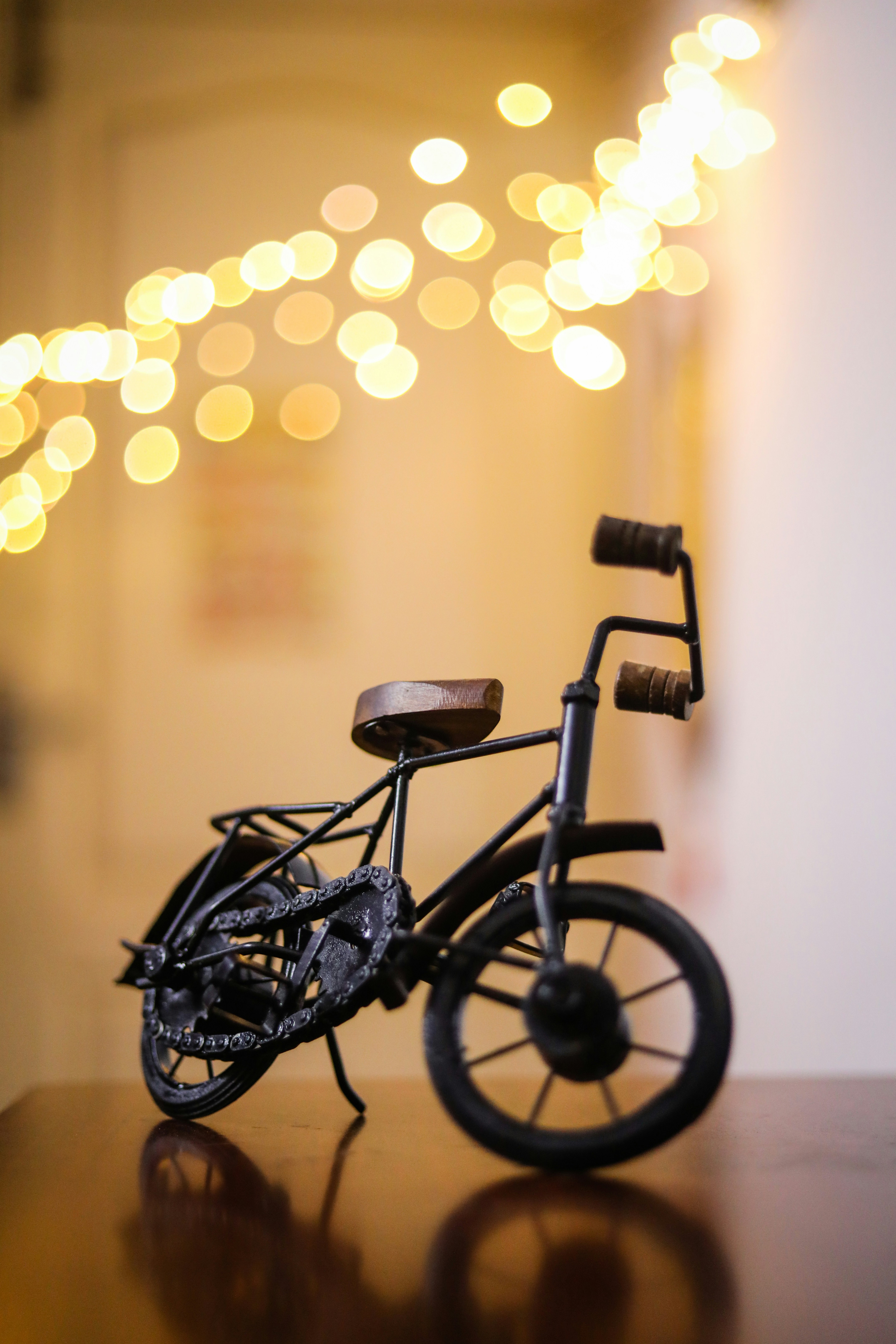 Miniature Bicycle Dreams Amidst Twinkling Lights