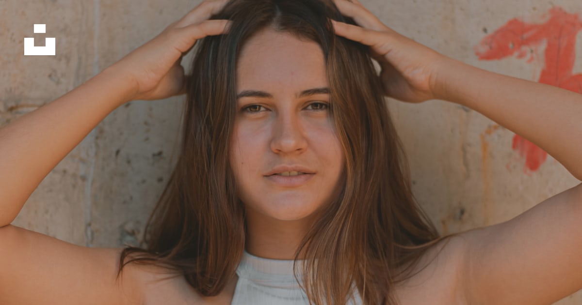 Woman In White Tank Top Holding Her Hair Photo Free Sp Image On Unsplash