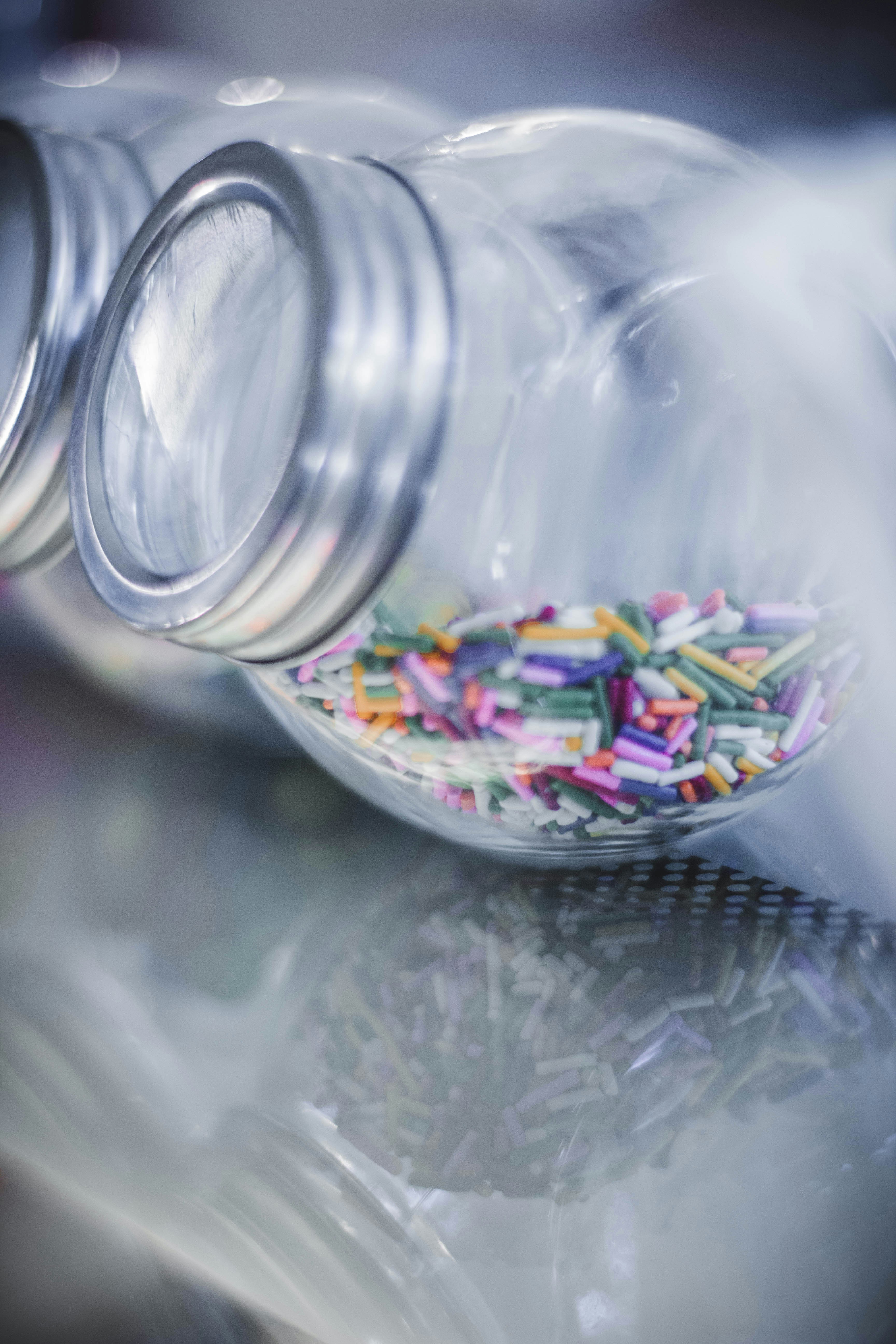 Glass Jar of Sprinkles: A Quiet Close-Up on Colorful Sugar Gems