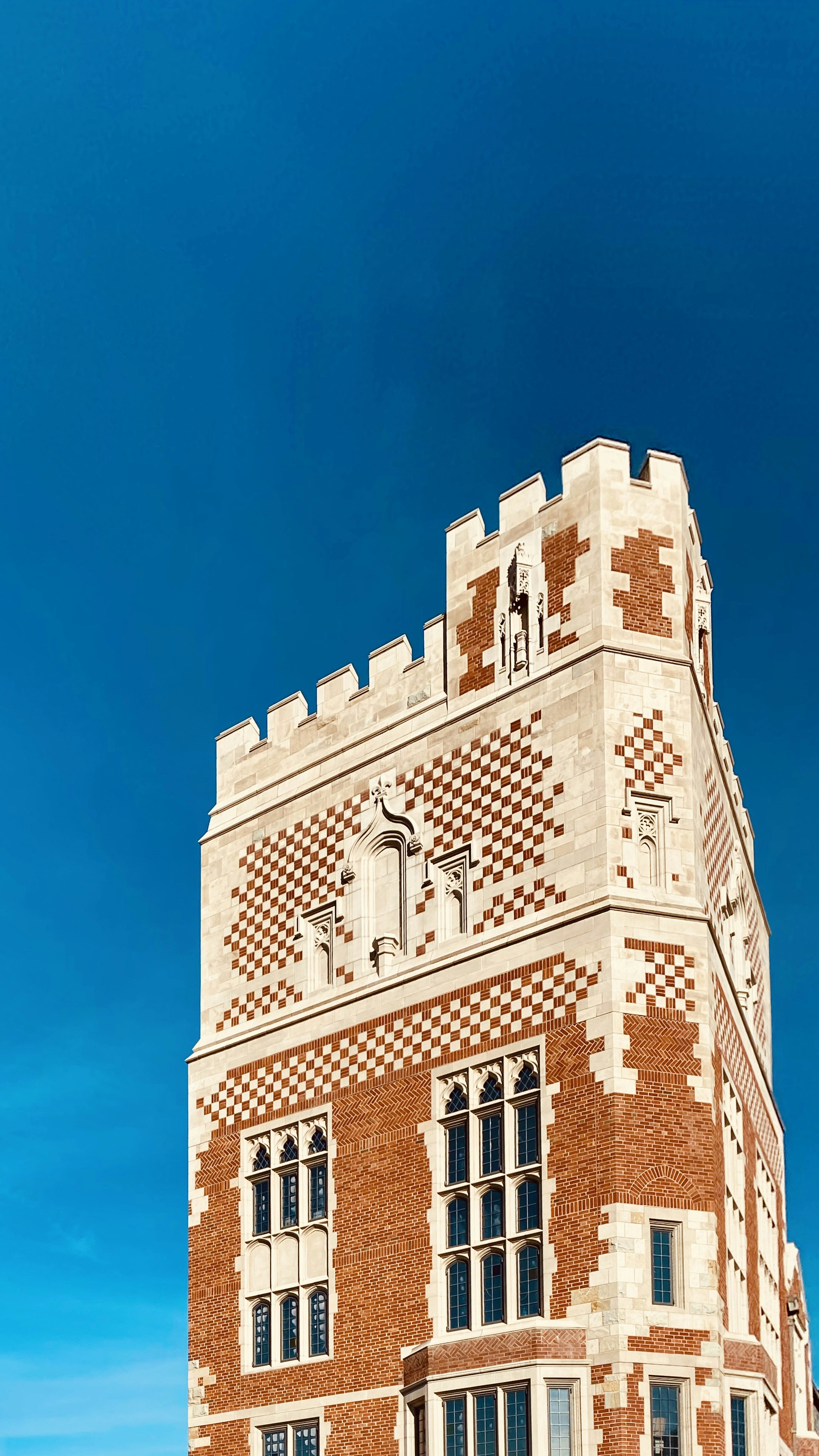 Castle Tower Reaching into a Clear Blue Sky