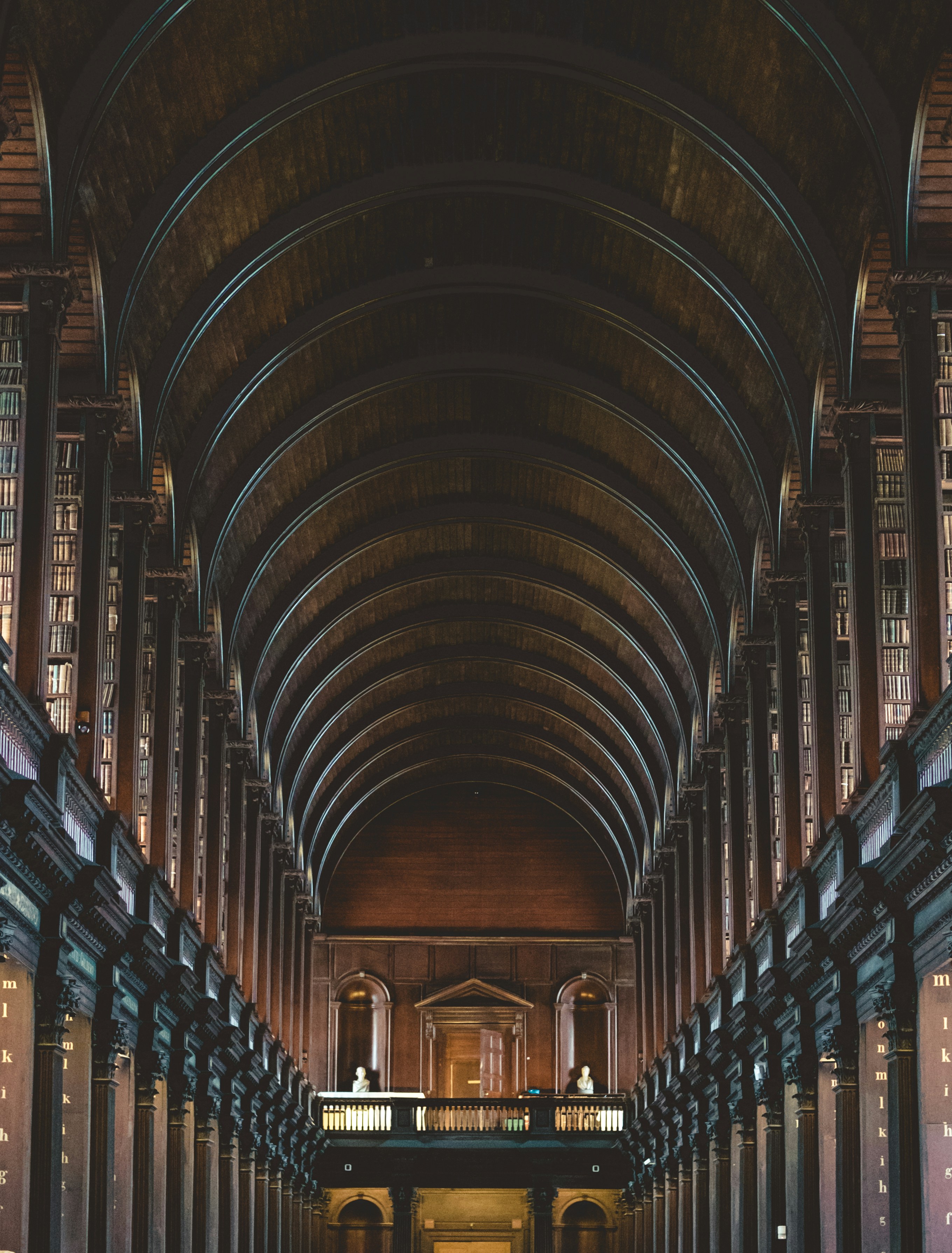 Vaulted Library of Echoes: A Copper-Glow Cathedral of Arches