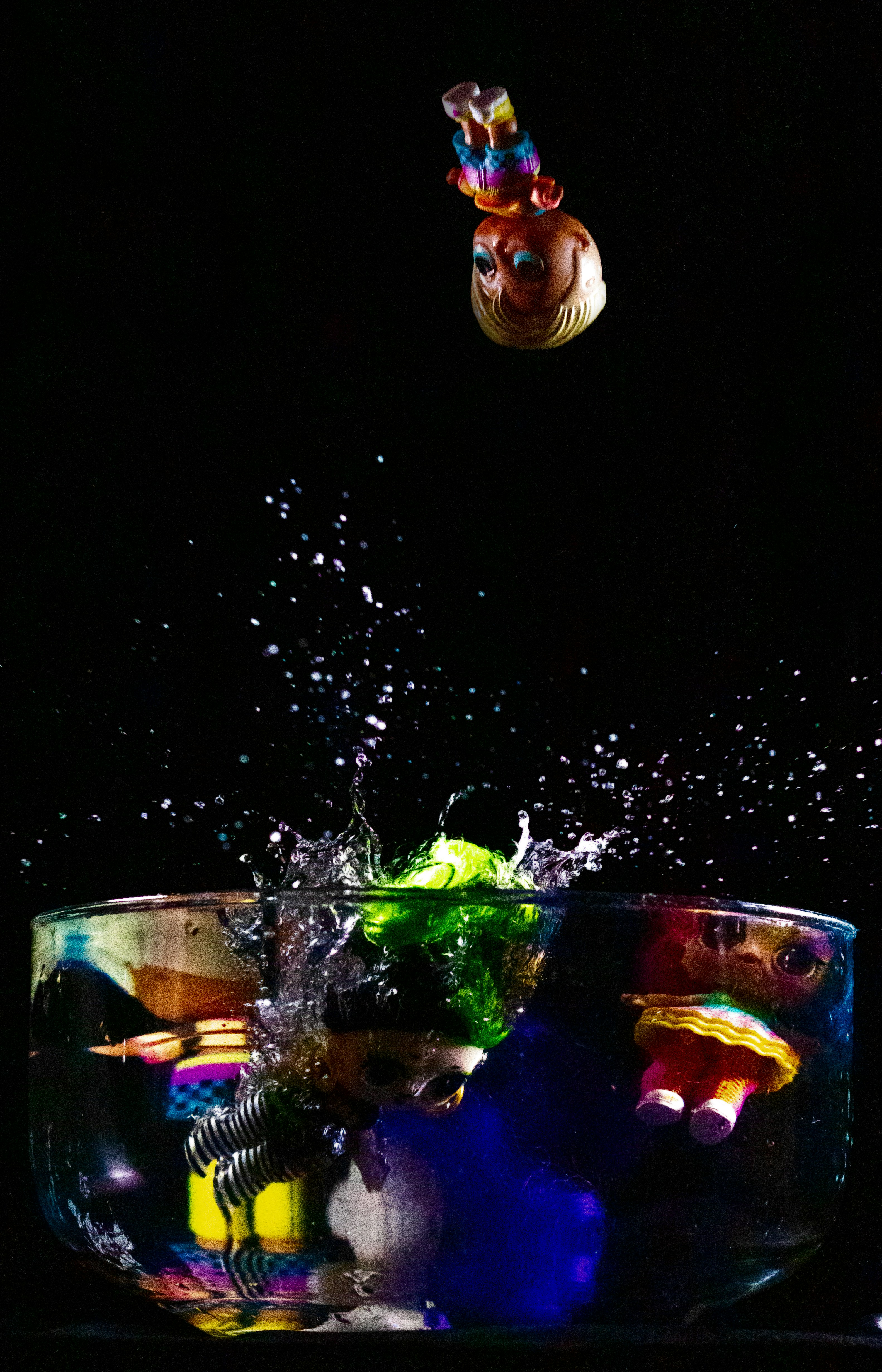 Pool Party!

I wanted to freeze a splash but I knew it will be kinda messy, not the beautiful crown-shaped drop splash that I never get right. But then again, my daughter Isabella was quite happy to help by dropping the L.O.L. dolls at my command. We did this like 50 times until I got this shot.

I like to think they are having much more fun that most of us during the quarantine that is still in effect in the Dominican Republic. But we will catch up, as soon as this pandemic is over!

#StaySafeAtHome
