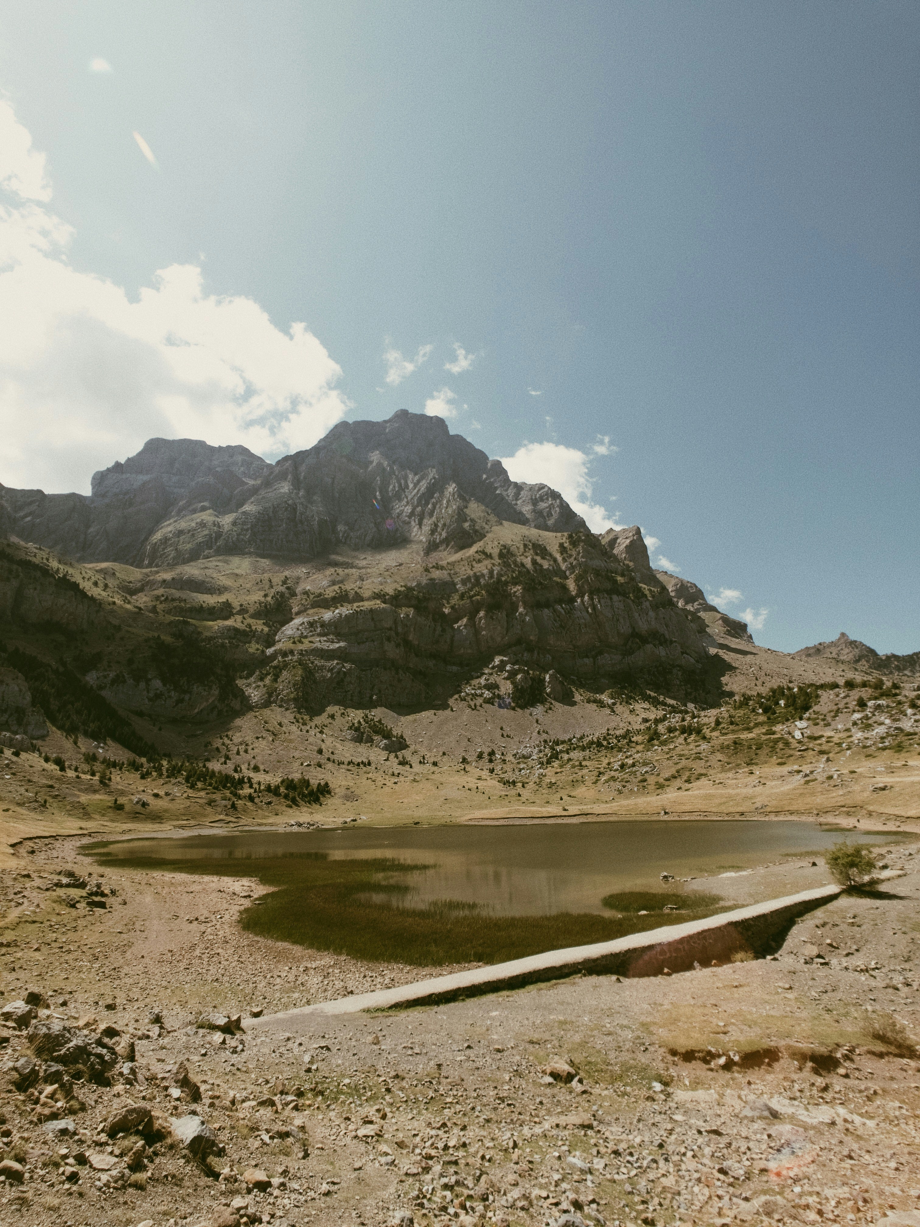 Brown and gray mountains under blue sky during daytime photo – Free ...