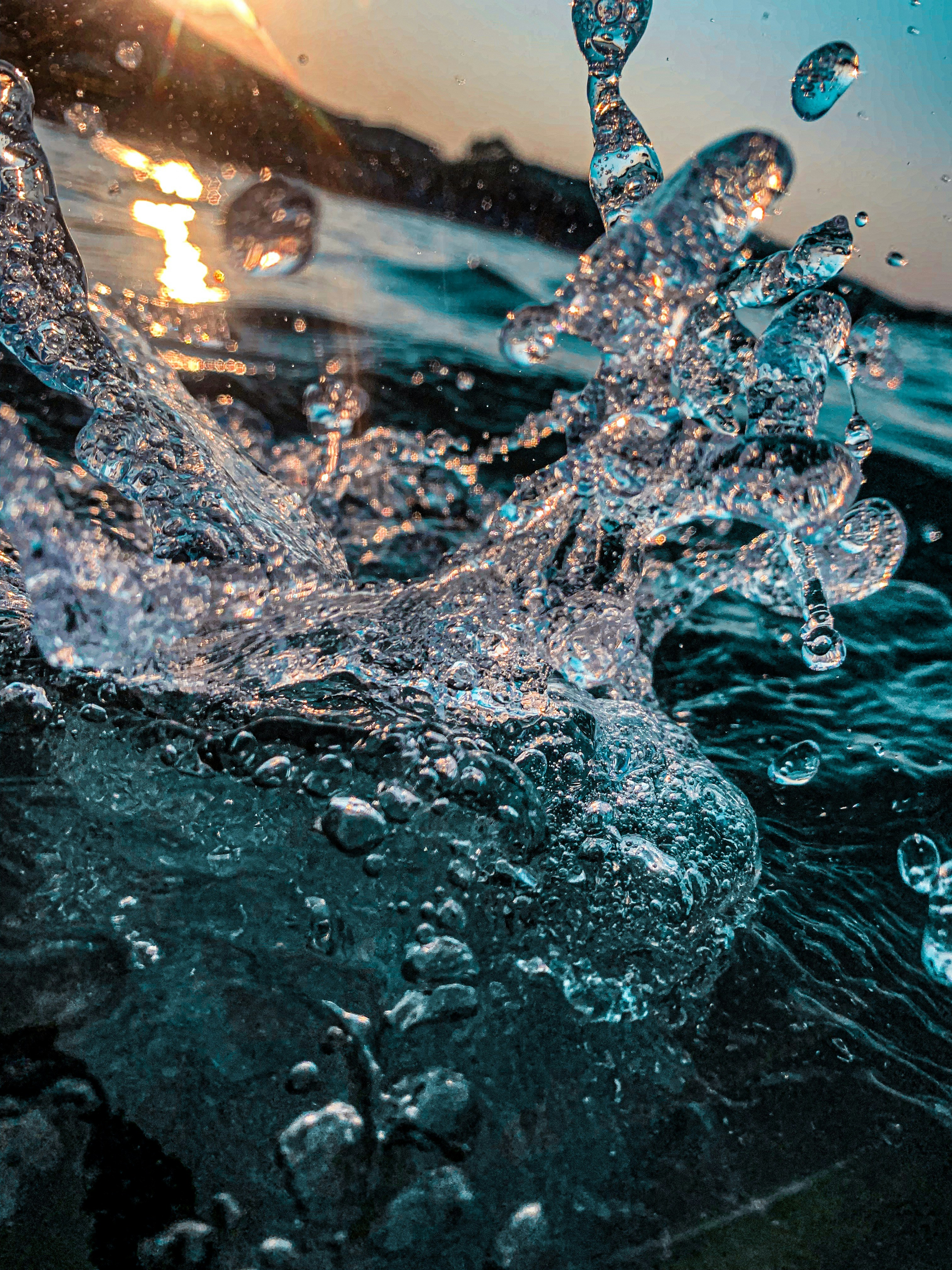 Water splash on body of water photo – Free Grey Image on Unsplash
