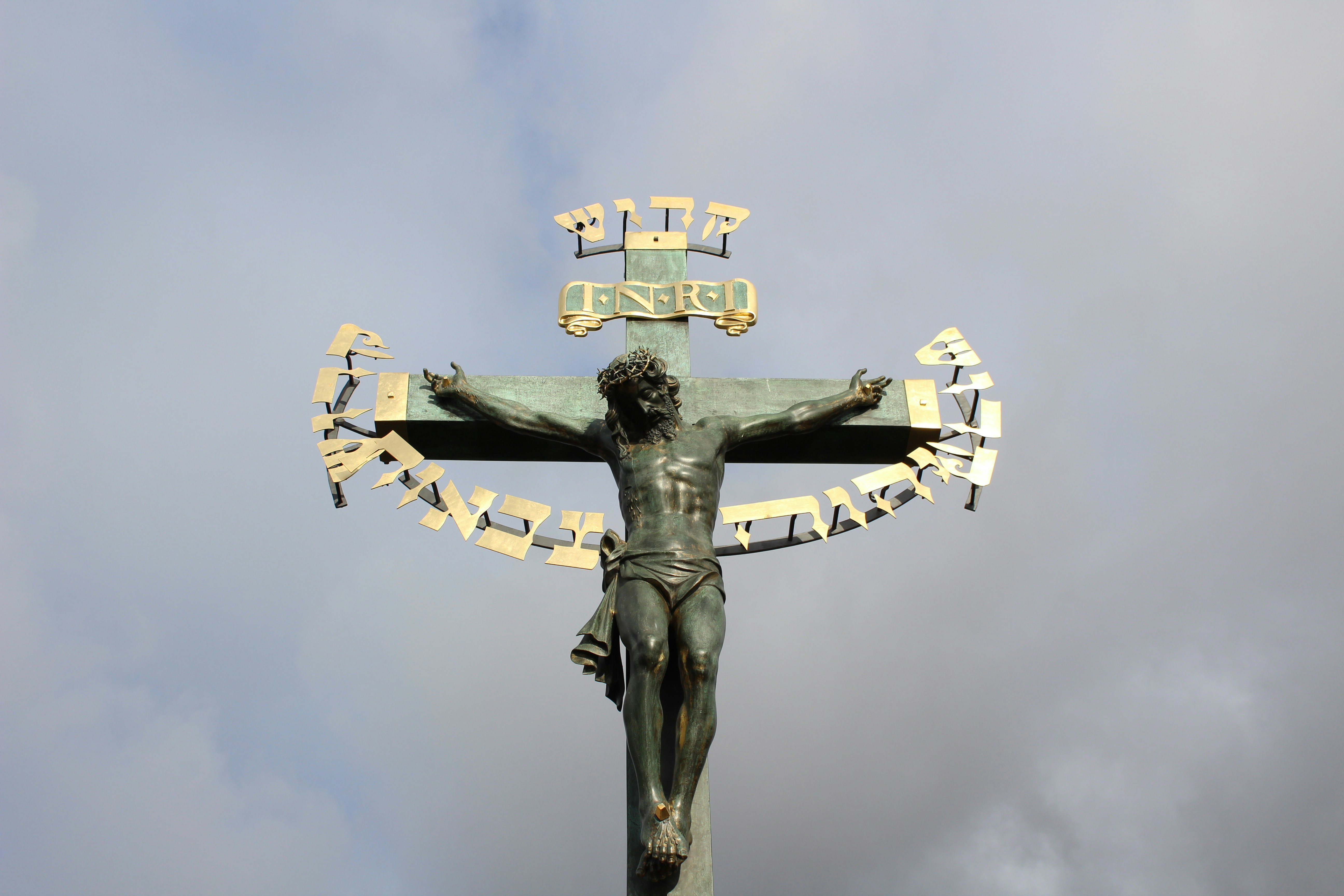 Skyward Glance: Monument Against the Clouds