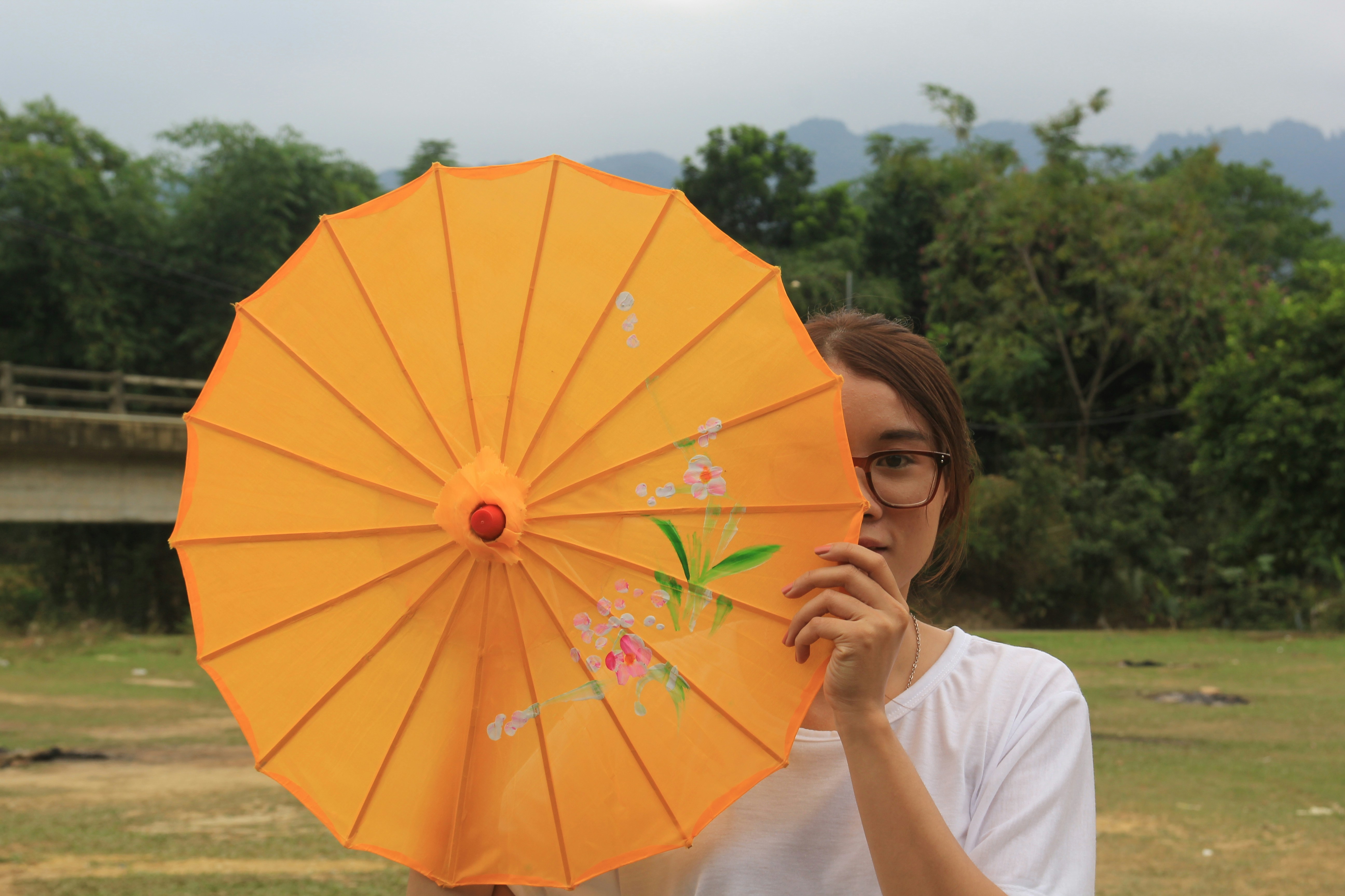 Orange Floral Parasol Portrait in a Quiet Field